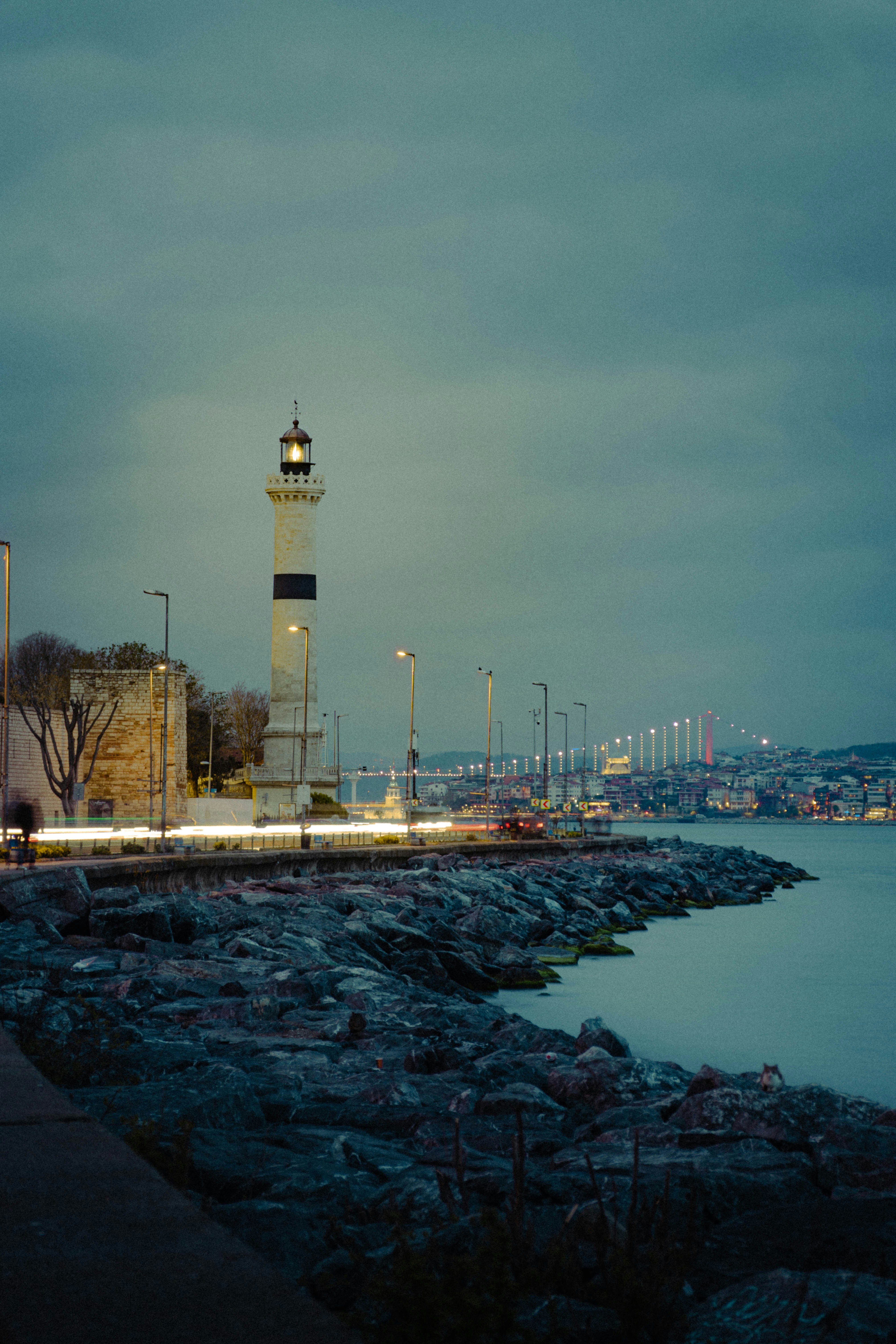 Lighthouse Promenade: A Quiet Night Along the Breakwater