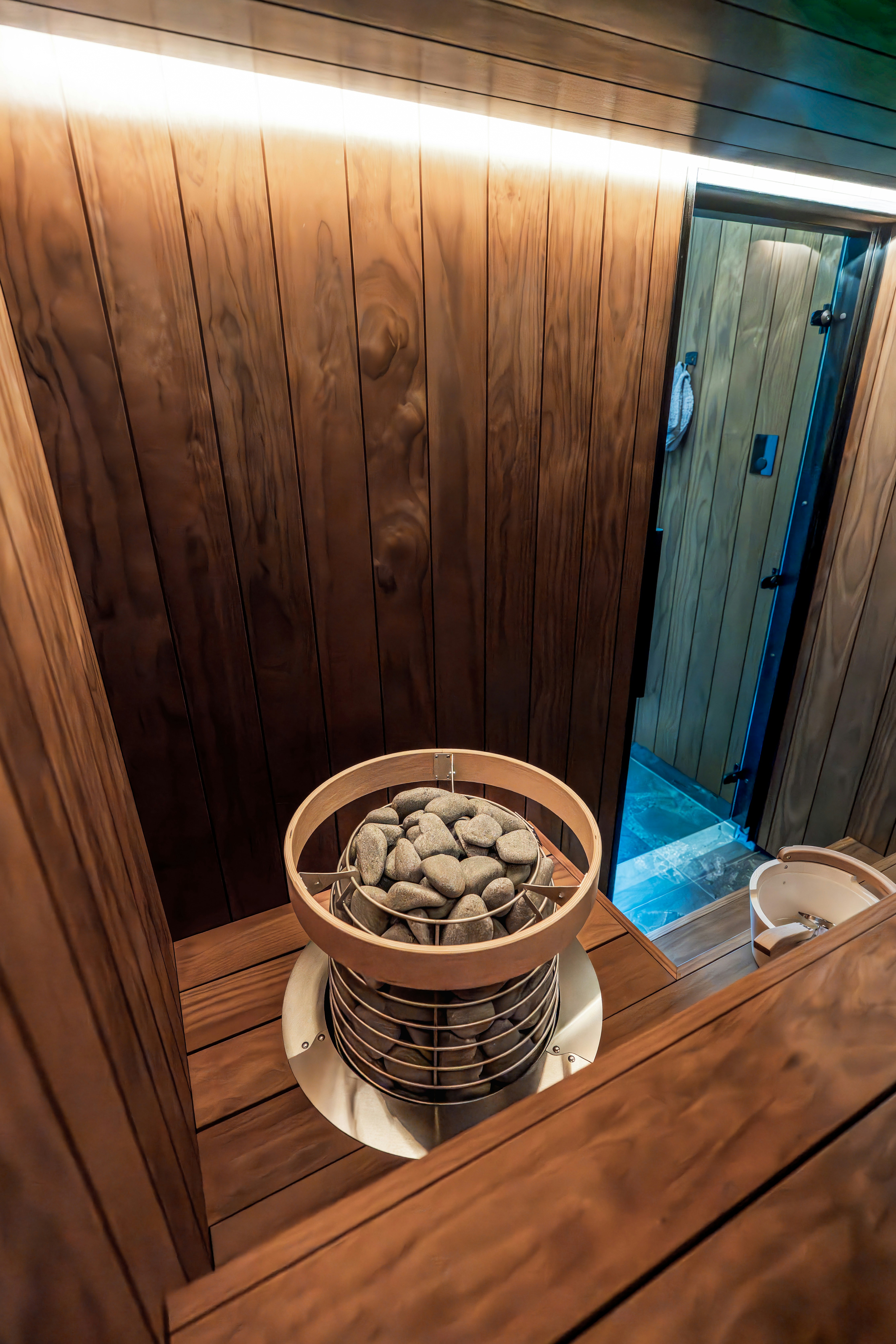 Cozy Heat: Stones Nestled in a Quiet Sauna