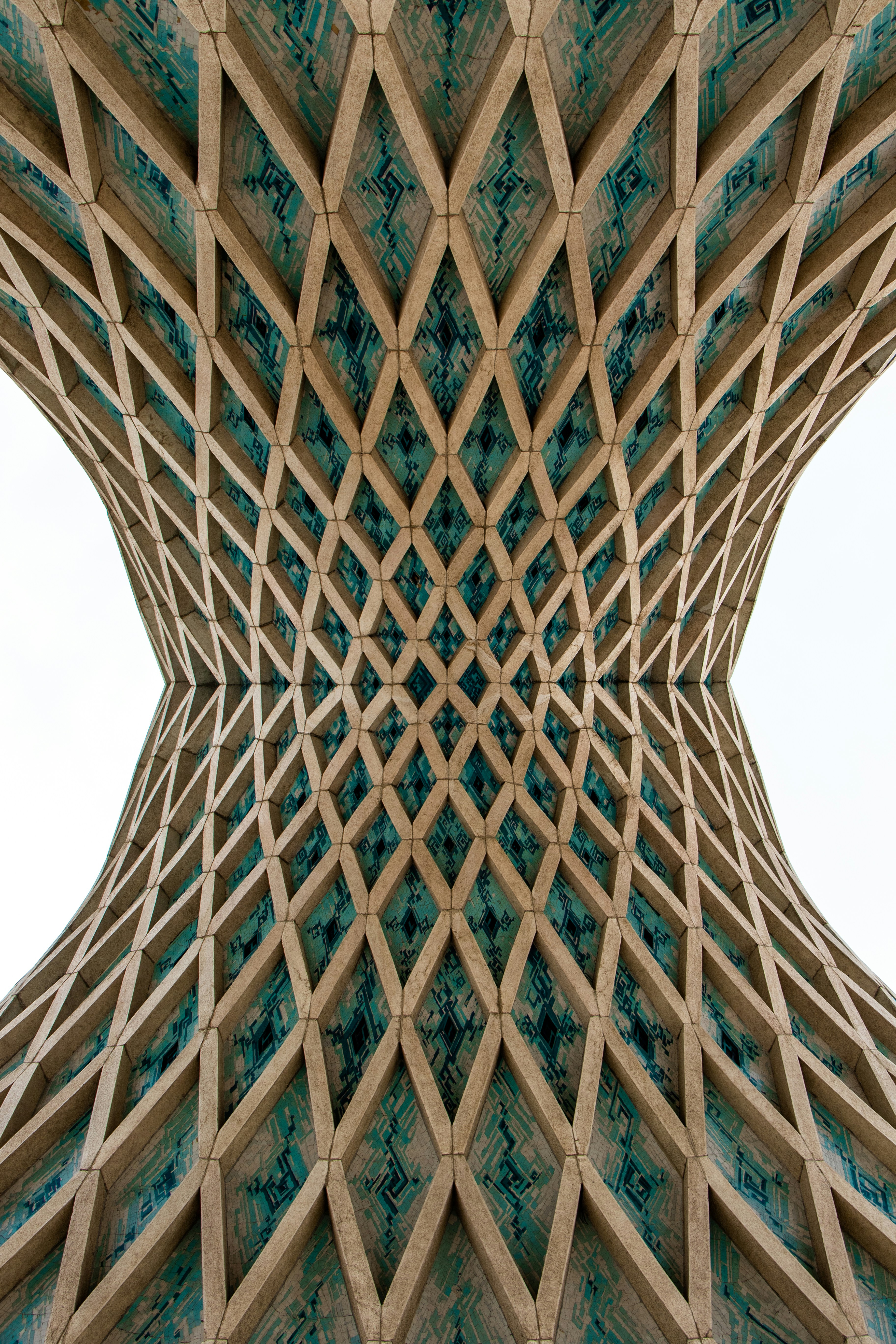 Interwoven Archways: A Symmetrical Facade Converging at the Midline