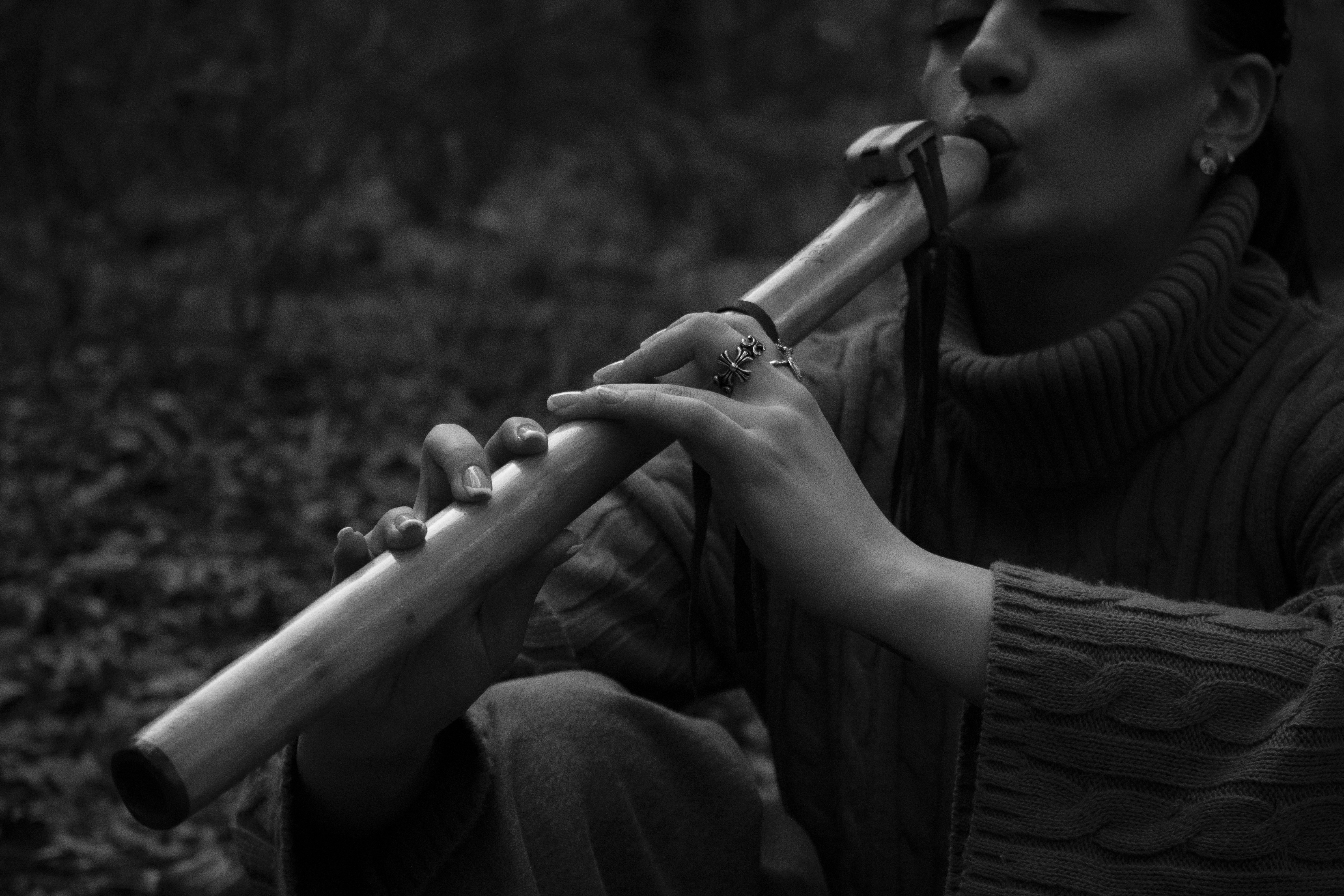 Whispering Reed: A Moment of Focus on Flute and Fingers