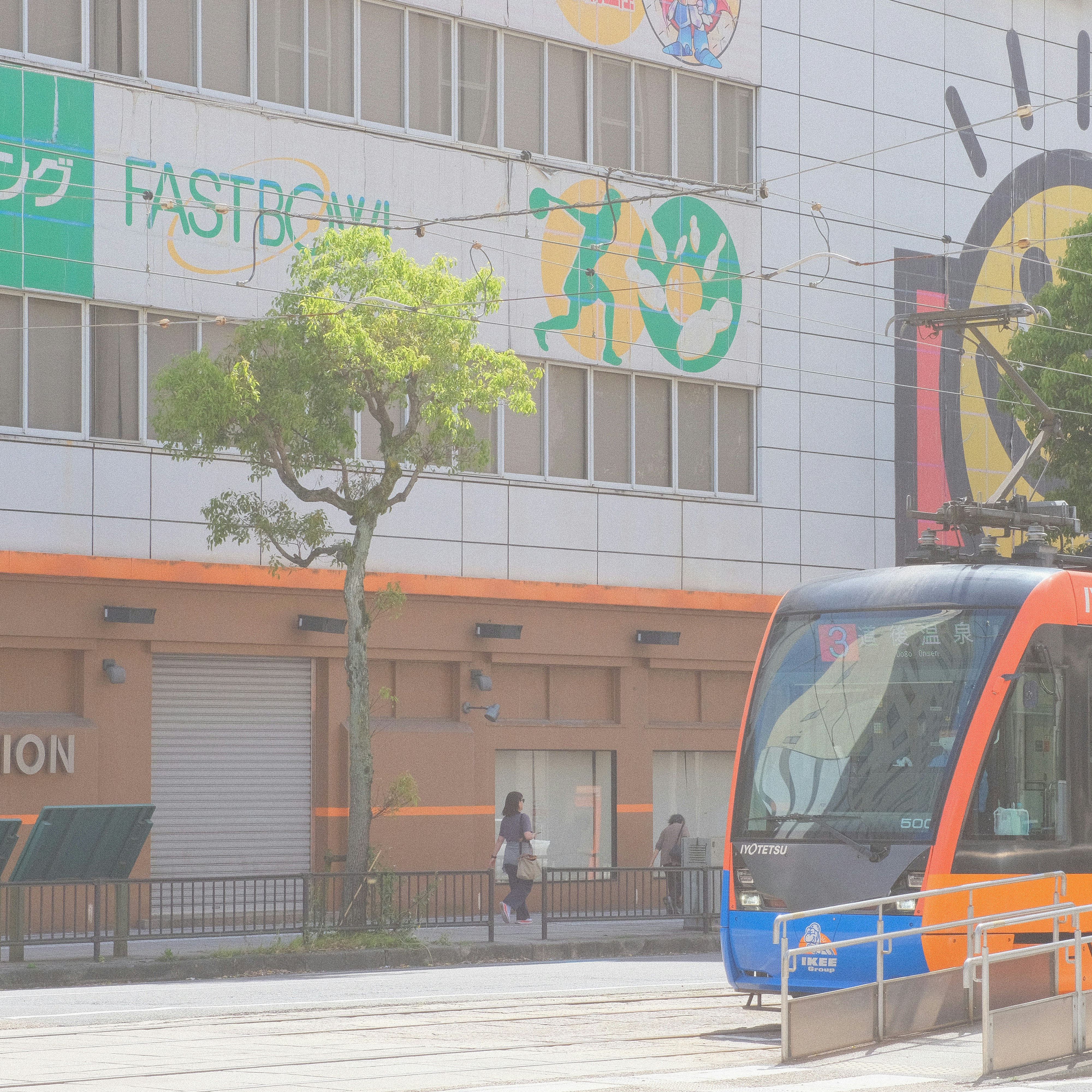Streetcar at the Edge of a Quiet City Scene