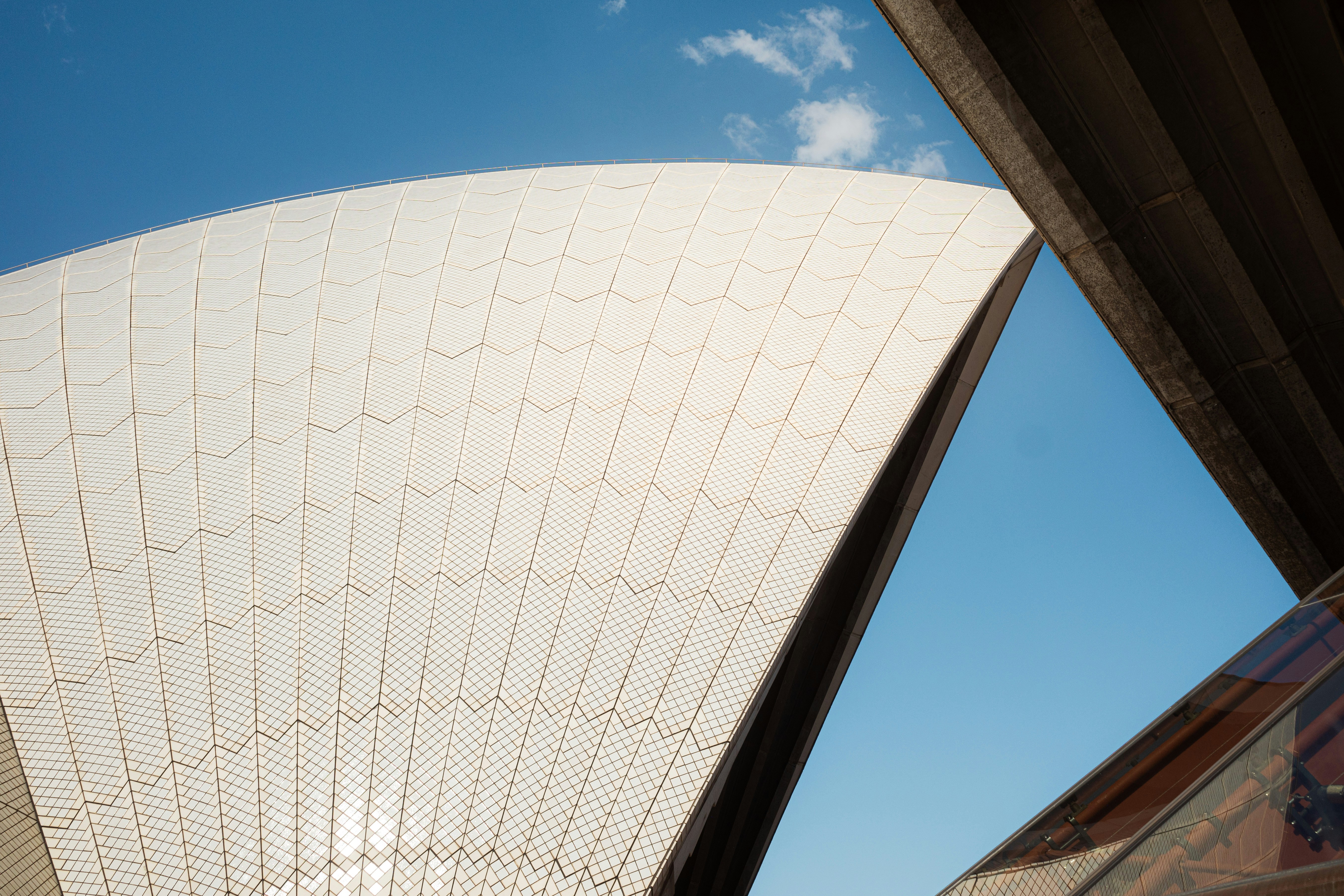 Blue Sky and Architectural Curve meet under a Modern Canopy