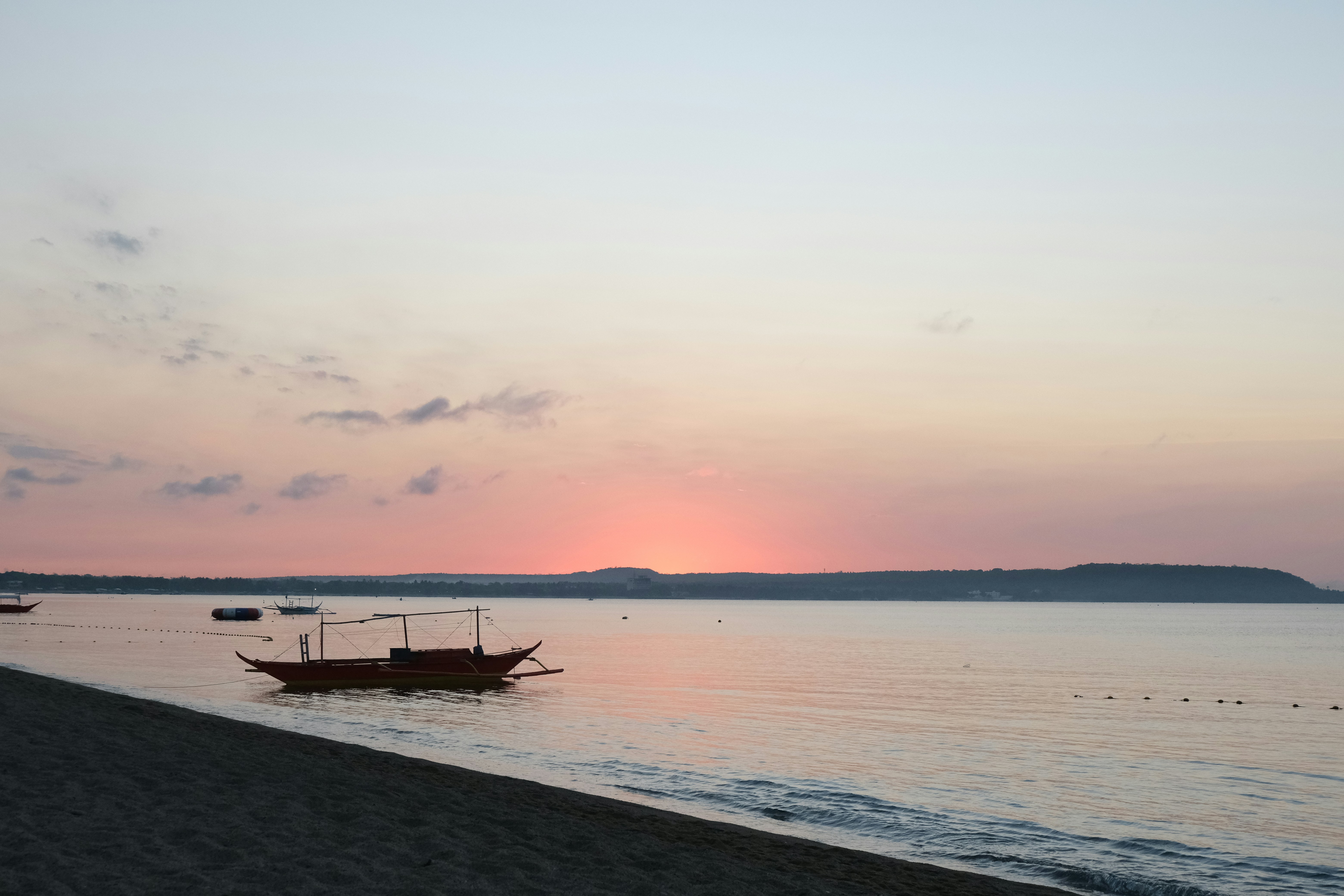 Sunset Vessel at the Quiet Shore