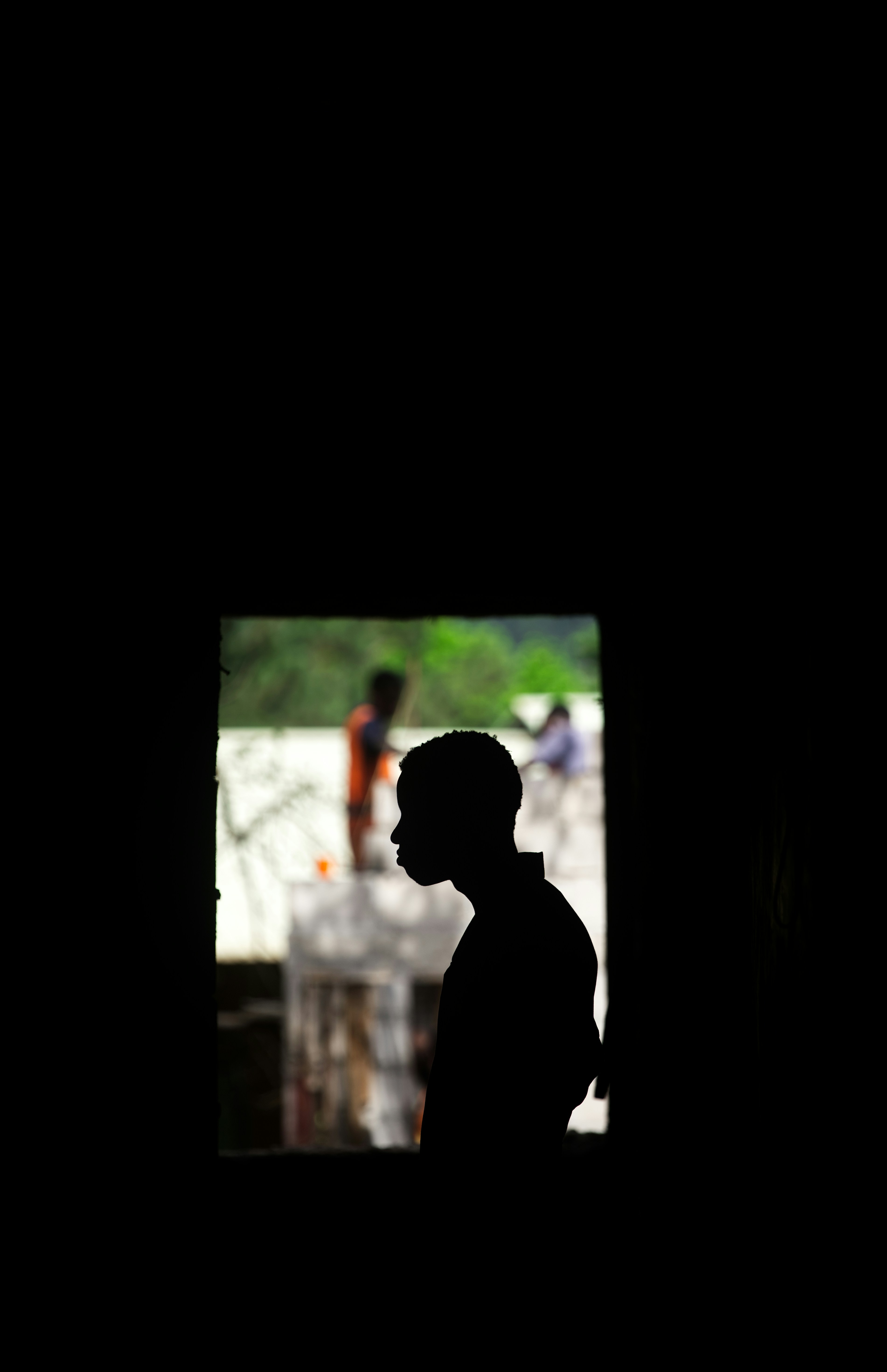Portrait in the Threshold: A Silhouette Against the Hidden Light