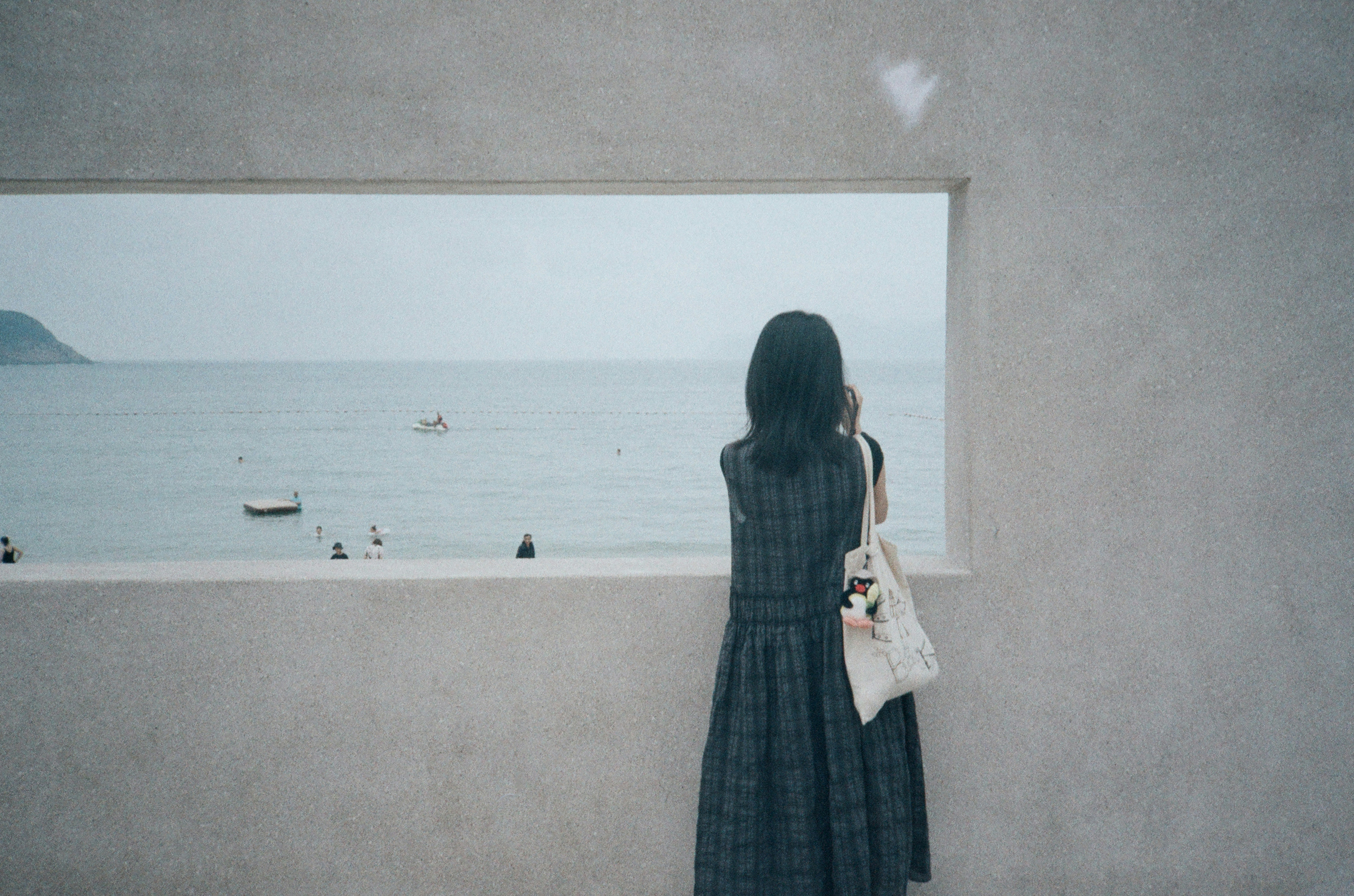 Window to the Sea: A Portrait at the Concrete Frame