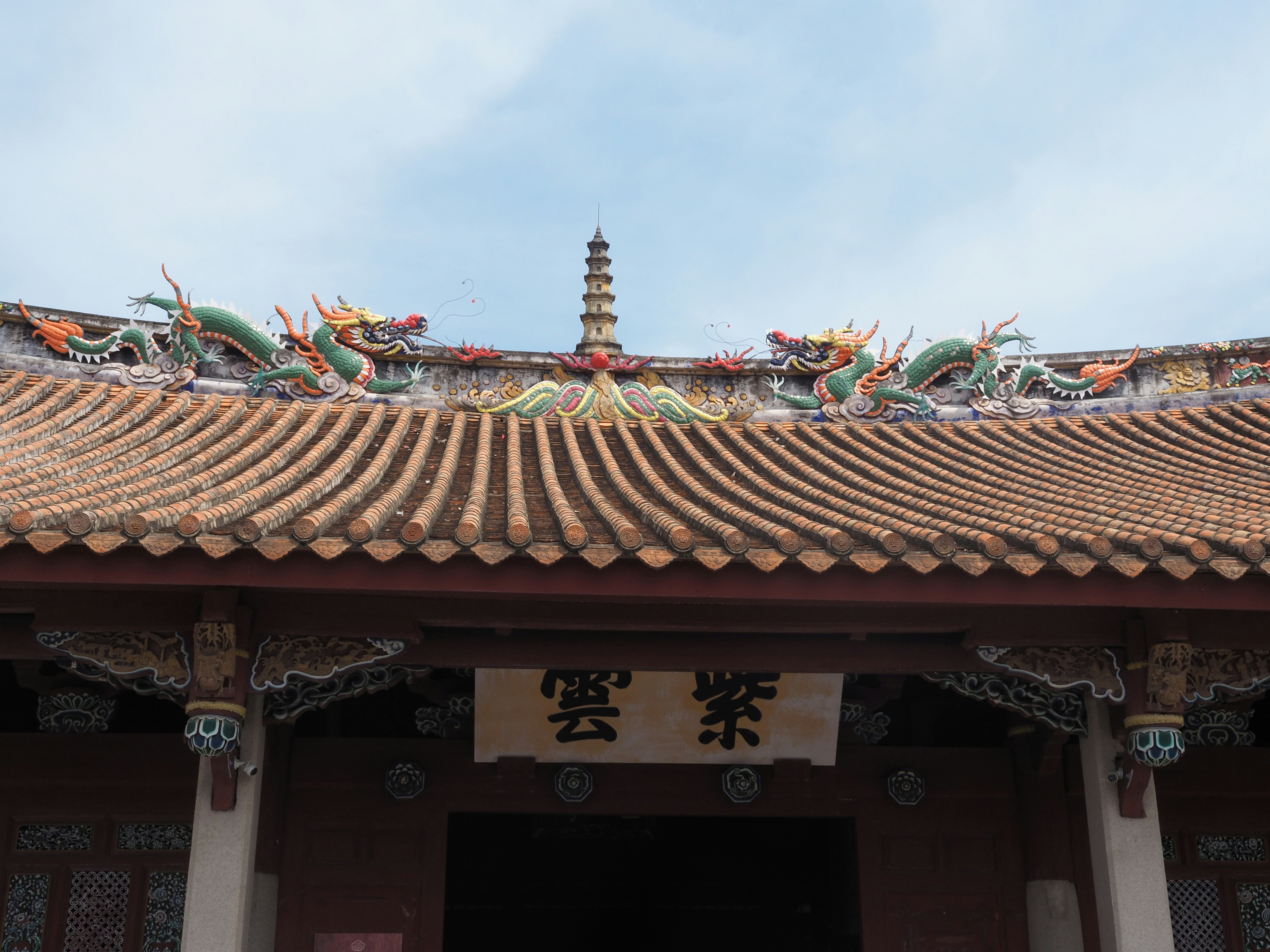 Dragon-Topped Corridor Under a Sky of Cerulean Blue
