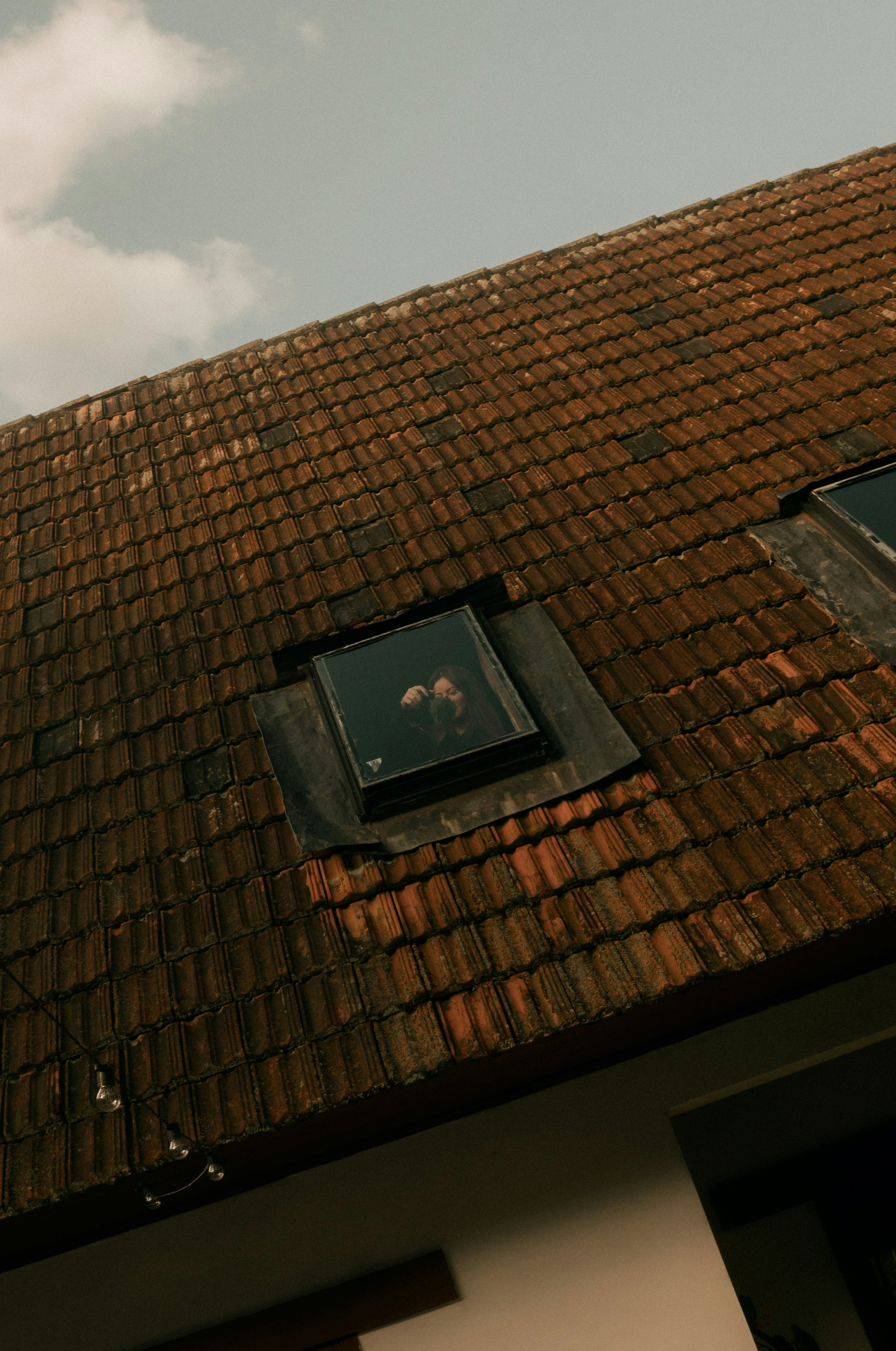 Windowed Moment on a Weathered Roof