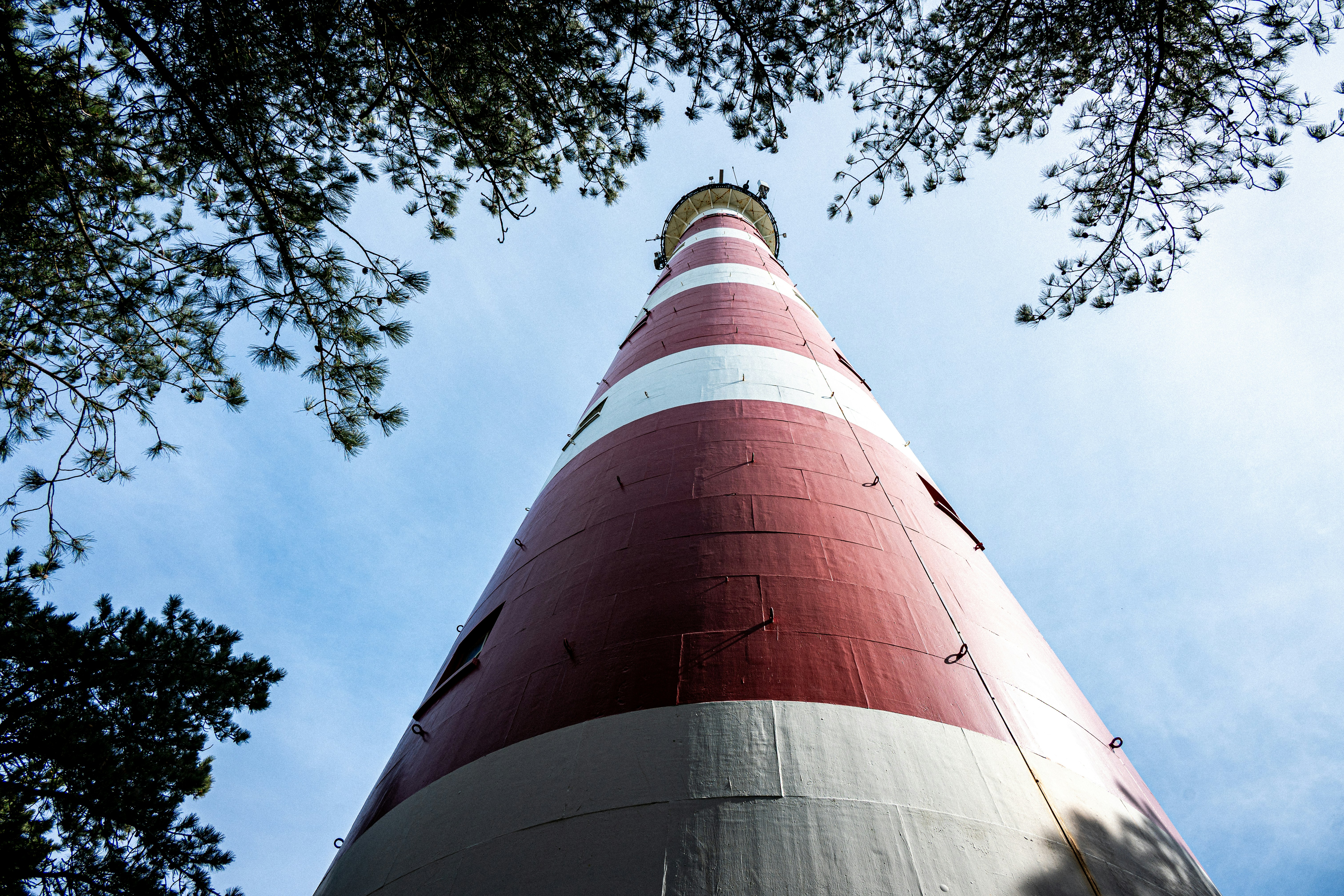 Skyward Stripe: A Low-Aangle View of the Red and White Beacon