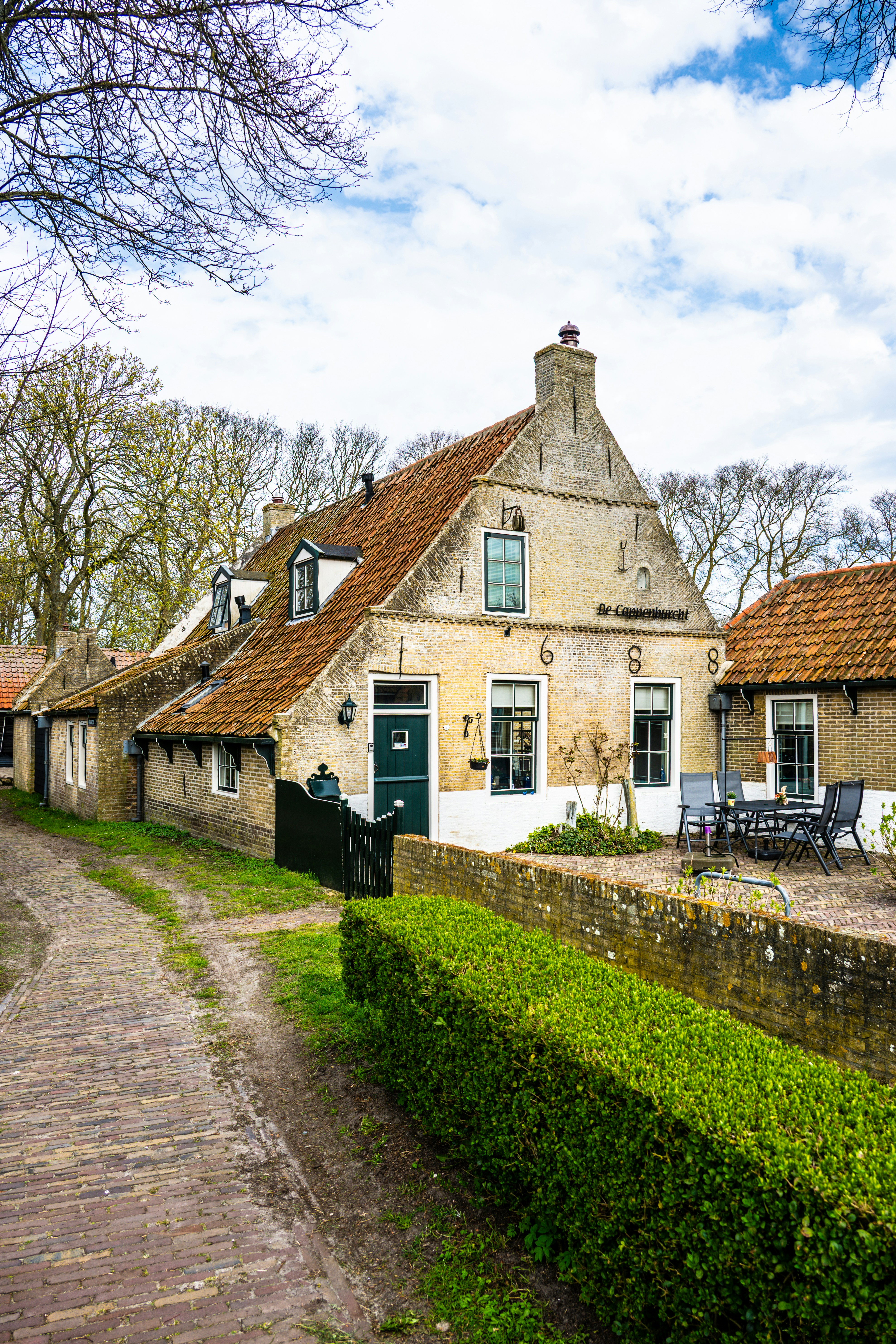 Cottage Row Under a Bright Sky