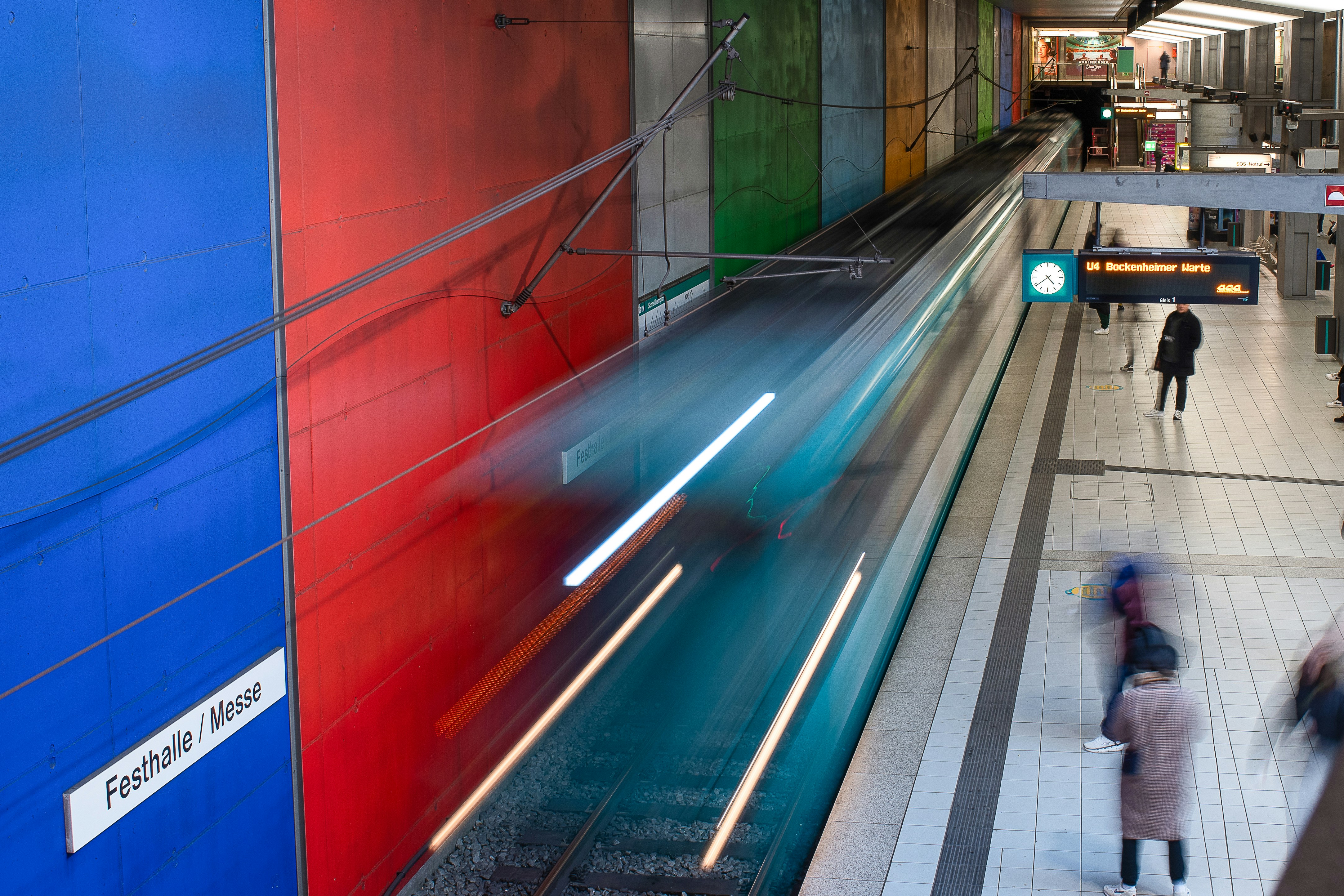 Colored Panels, Blurred Train: A Moment in Transit
