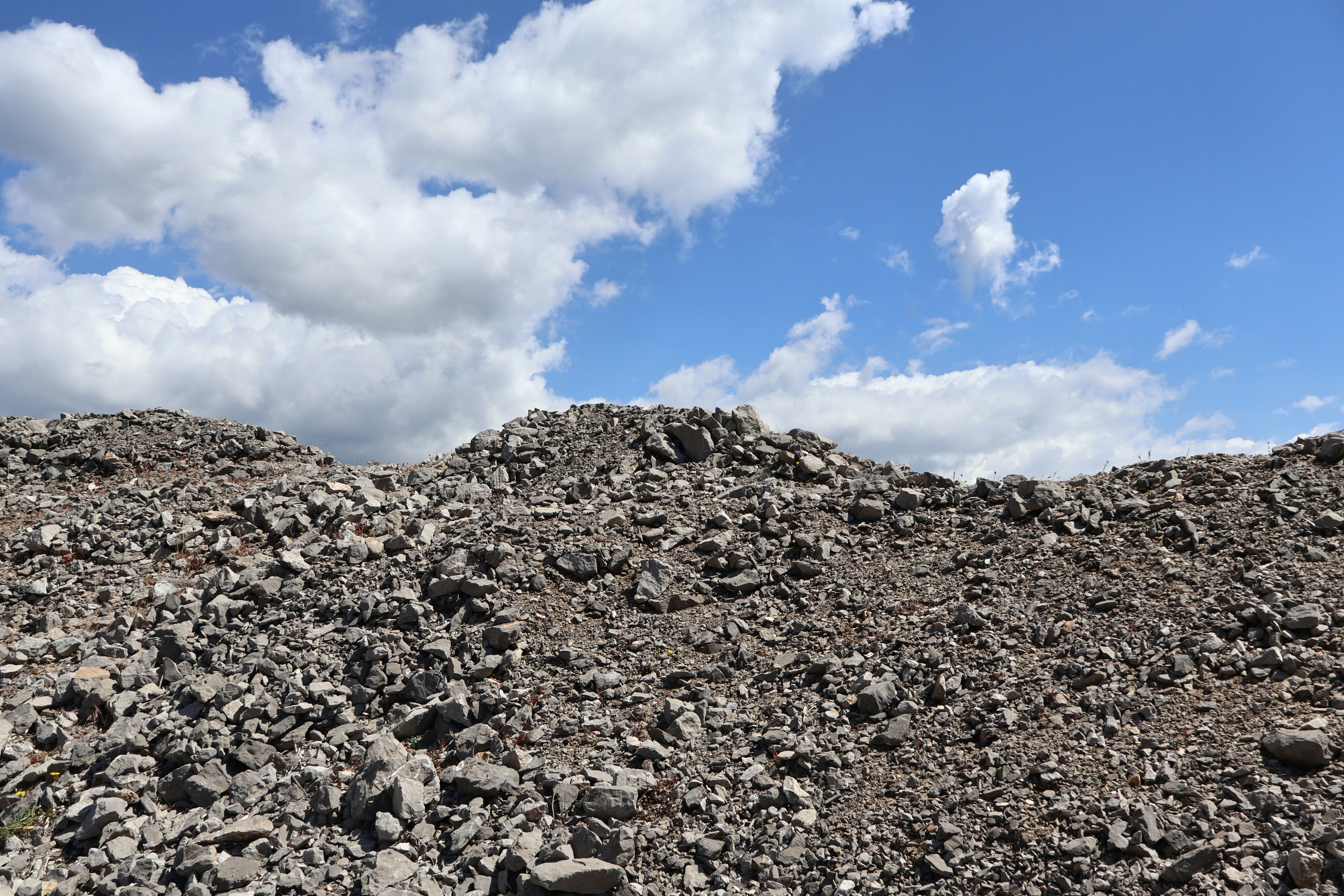 Ridge of Shattered Gravel Under a Wide Sky