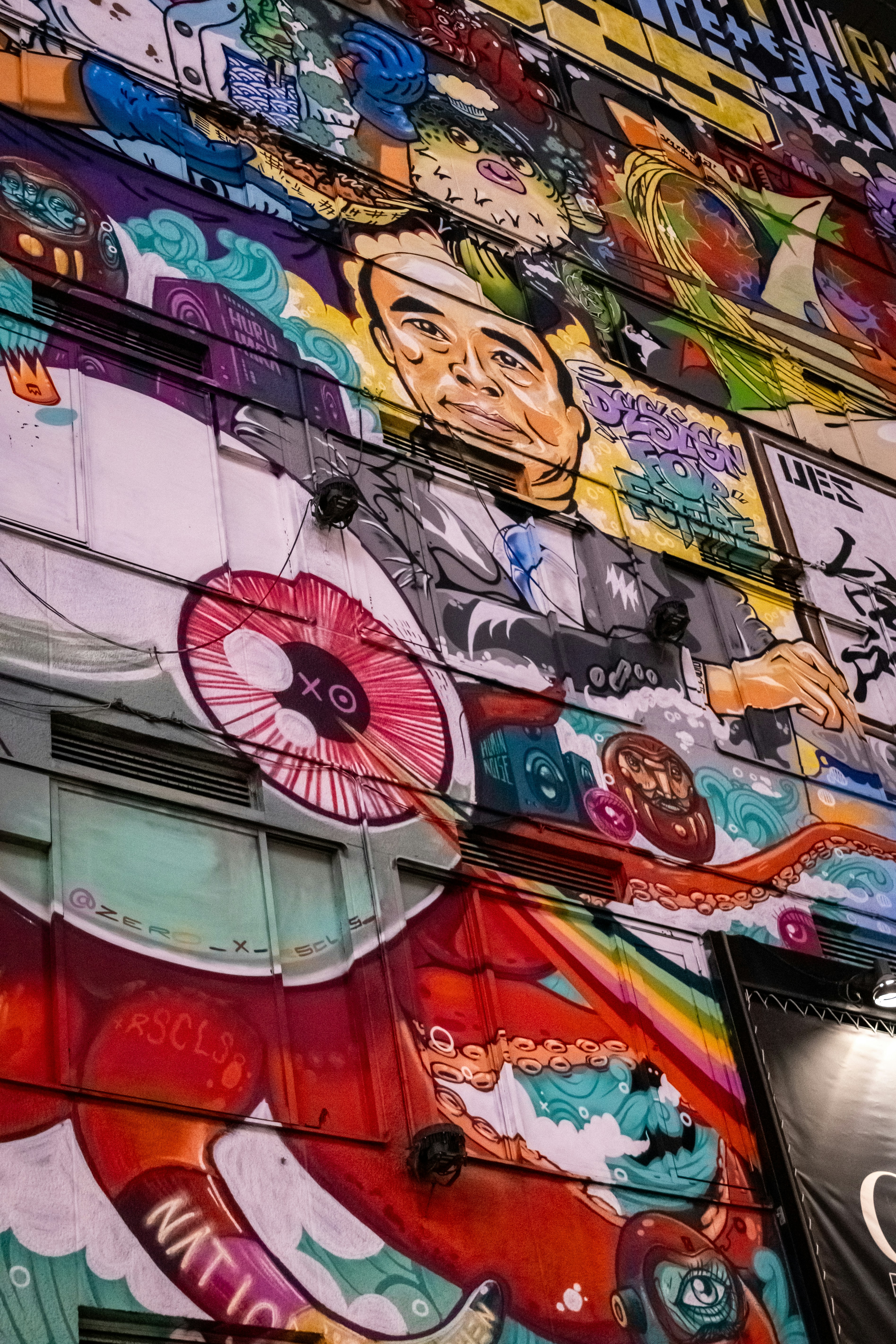 Vibrant Narrative on a Wall: Portraits and Graffiti in Motion