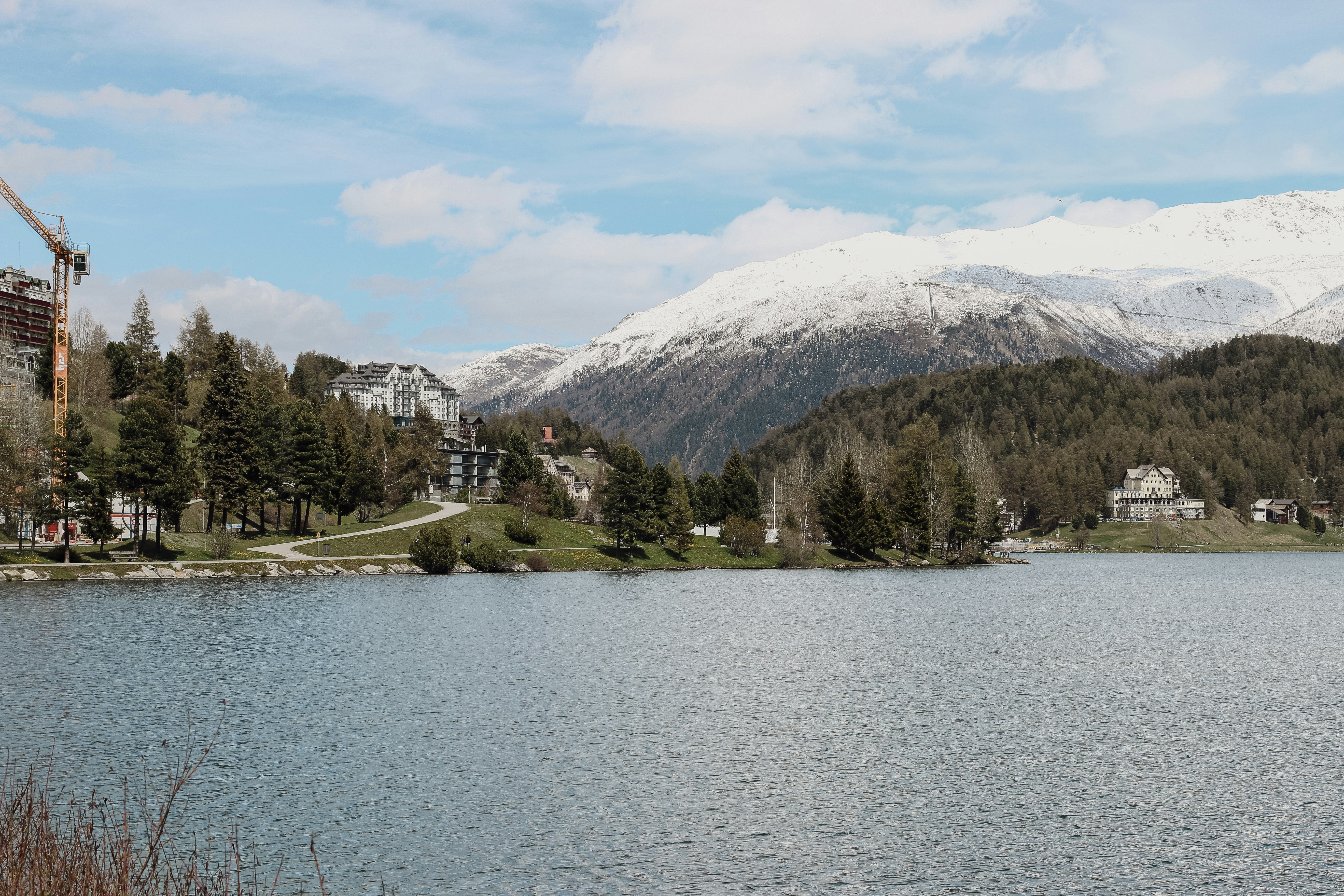 Snow-kissed Alps Mirror on a Quiet Lake
