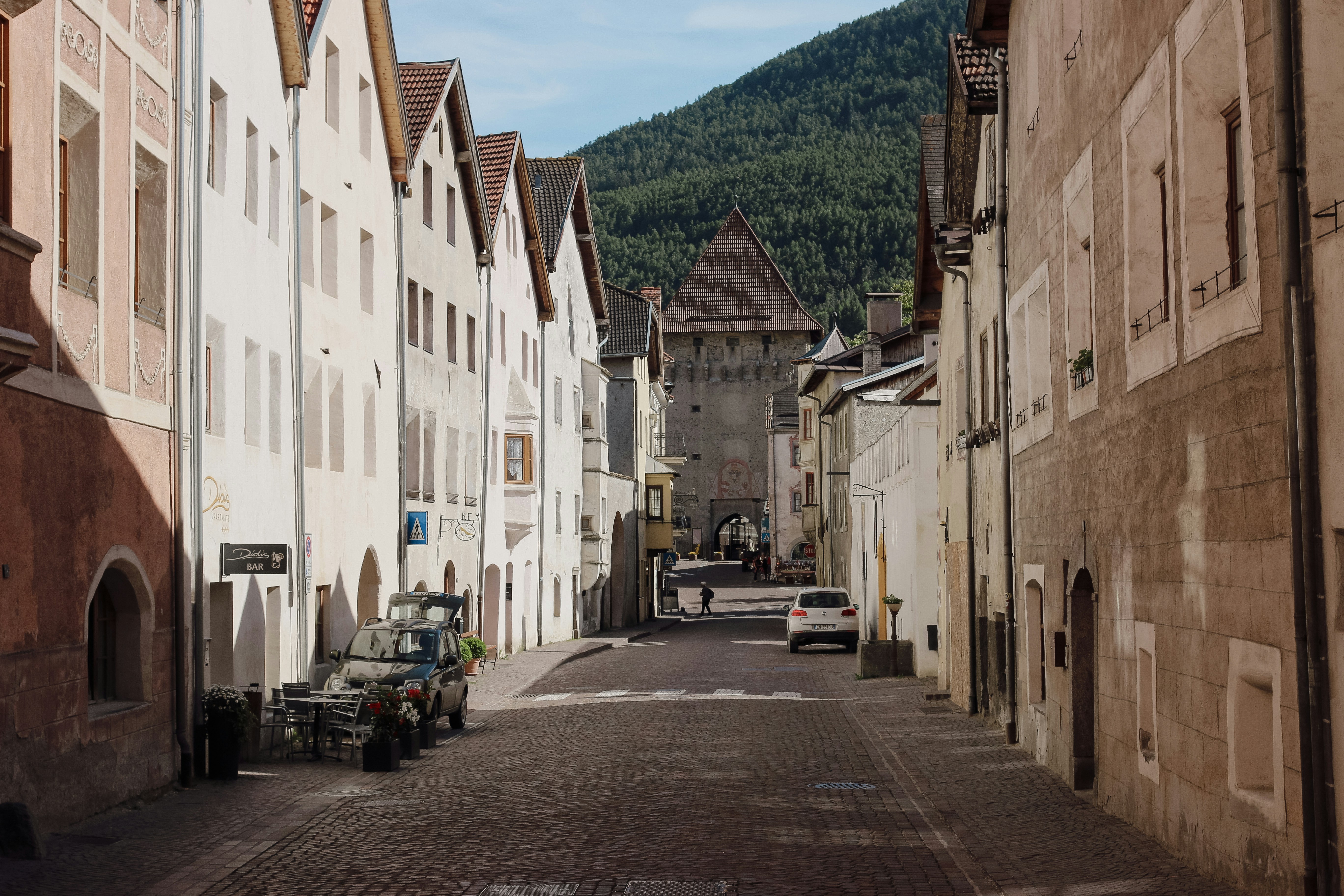 Gateway to the Old Town: A cobbled street Leading to the Arch