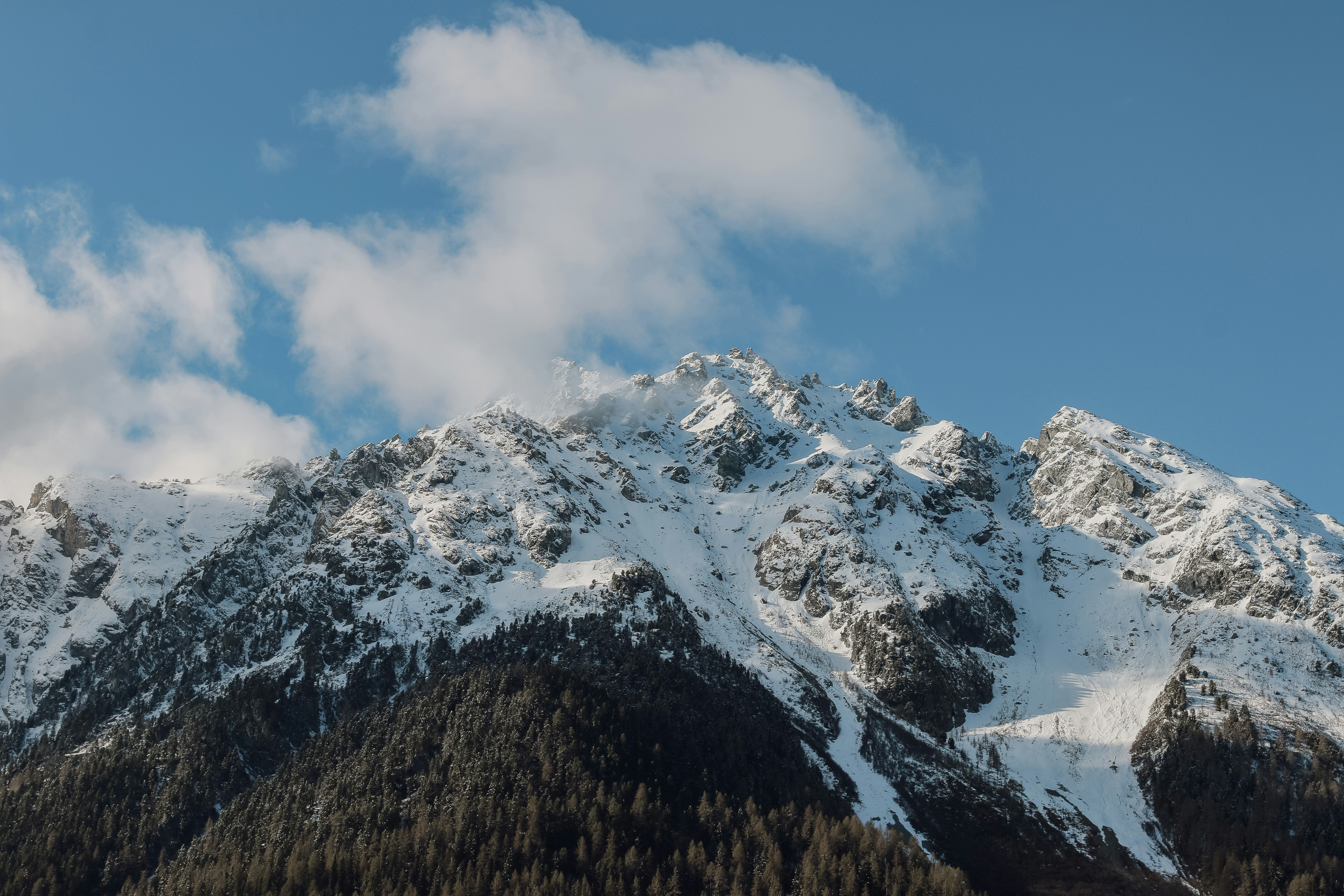 Snowbound Summit Under a Clear Sky