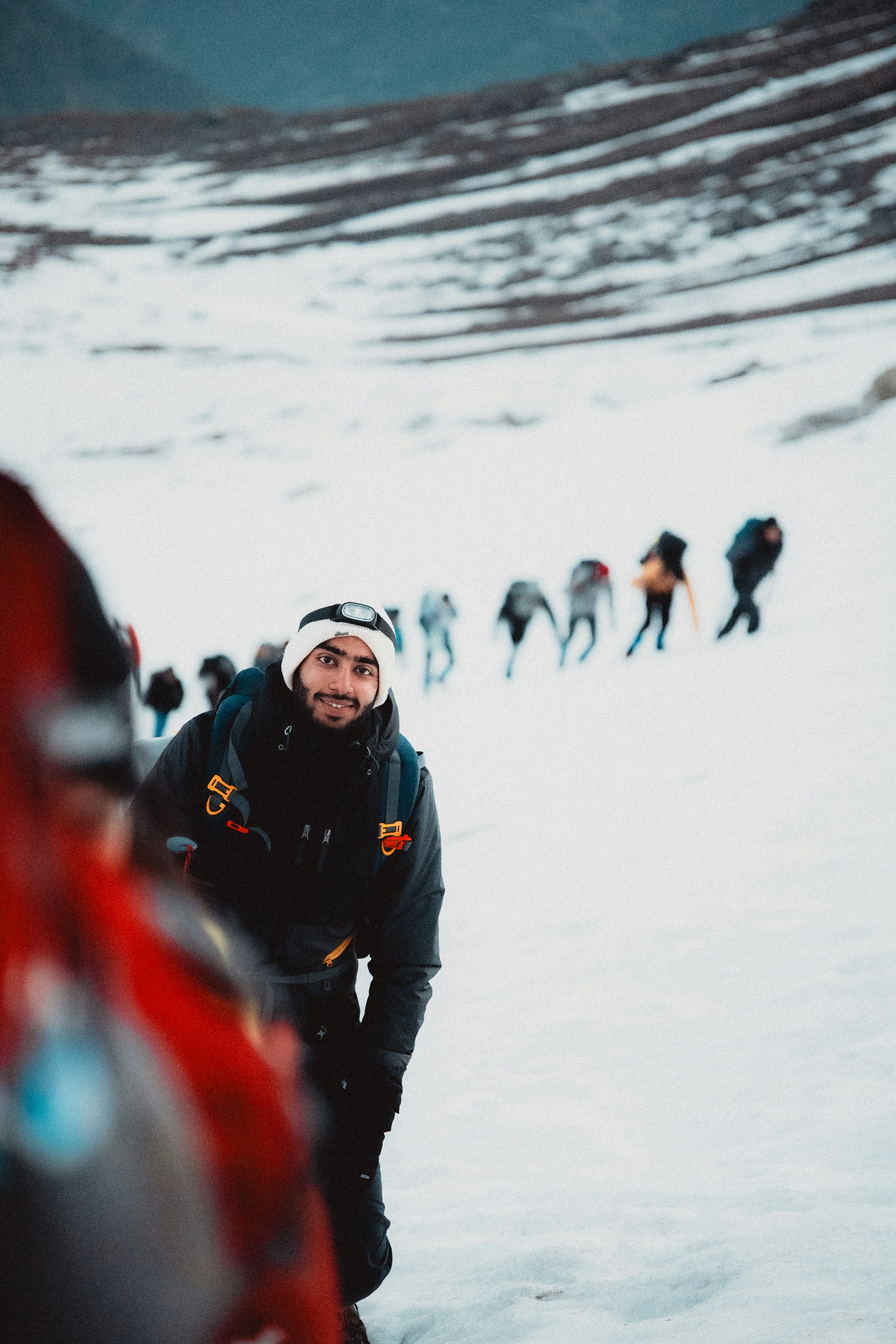 Snowbound Guide: A Climber’s Gaze in a Mountain Assembly
