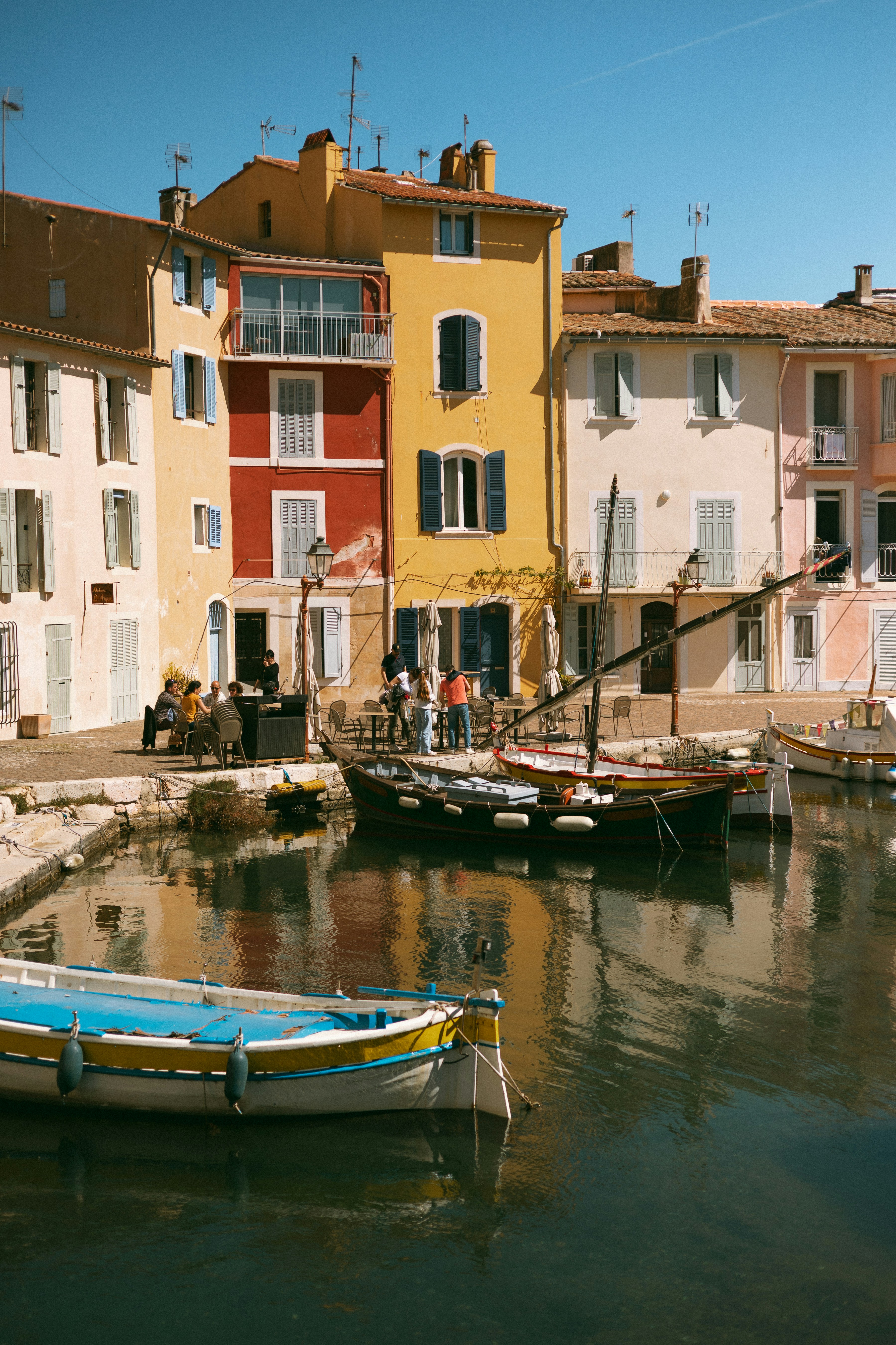 Vivid riverside village with colorful facades and a small harbor