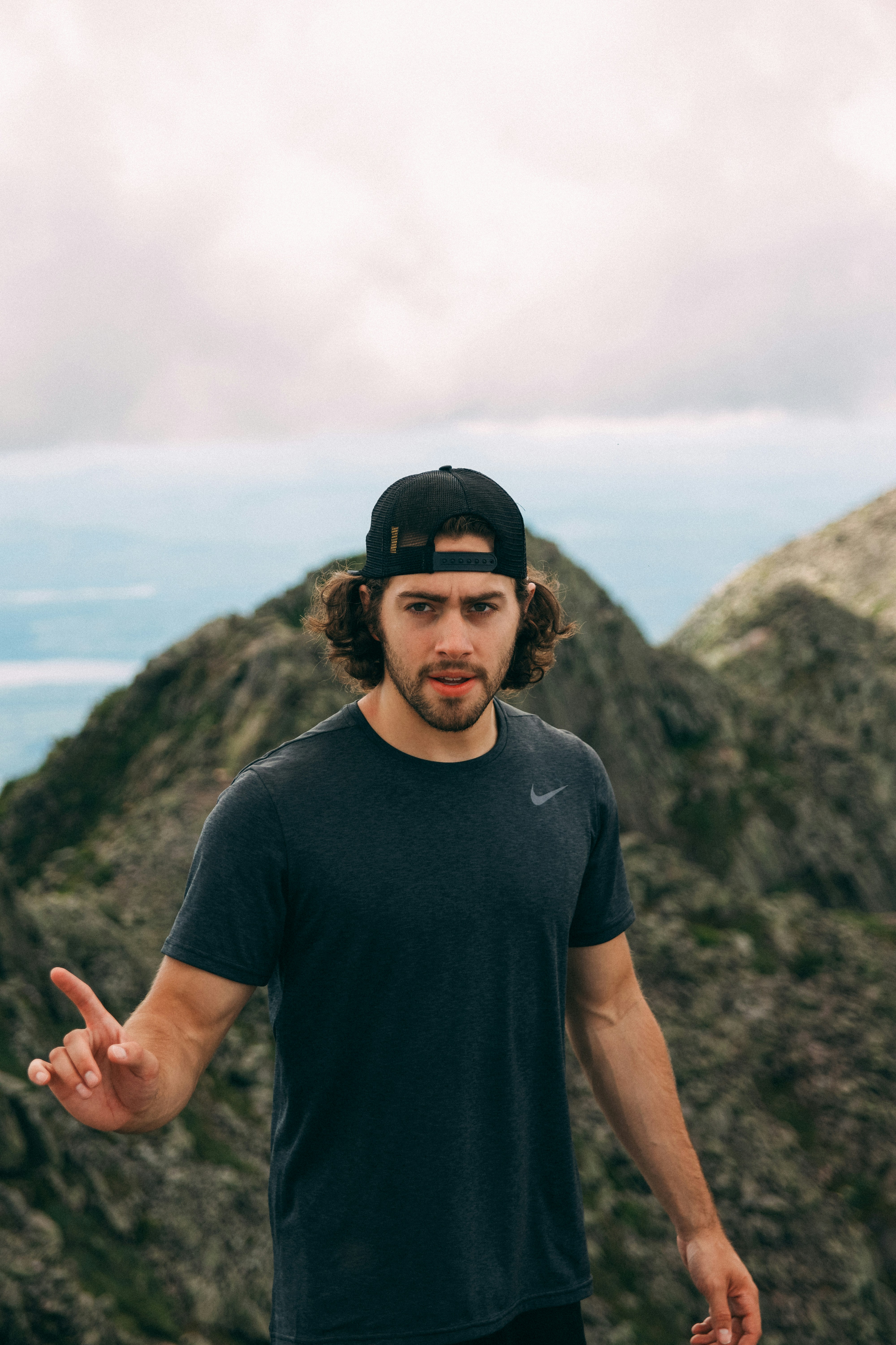 Trailmaster at the Summit: A Moment on the Peaks
