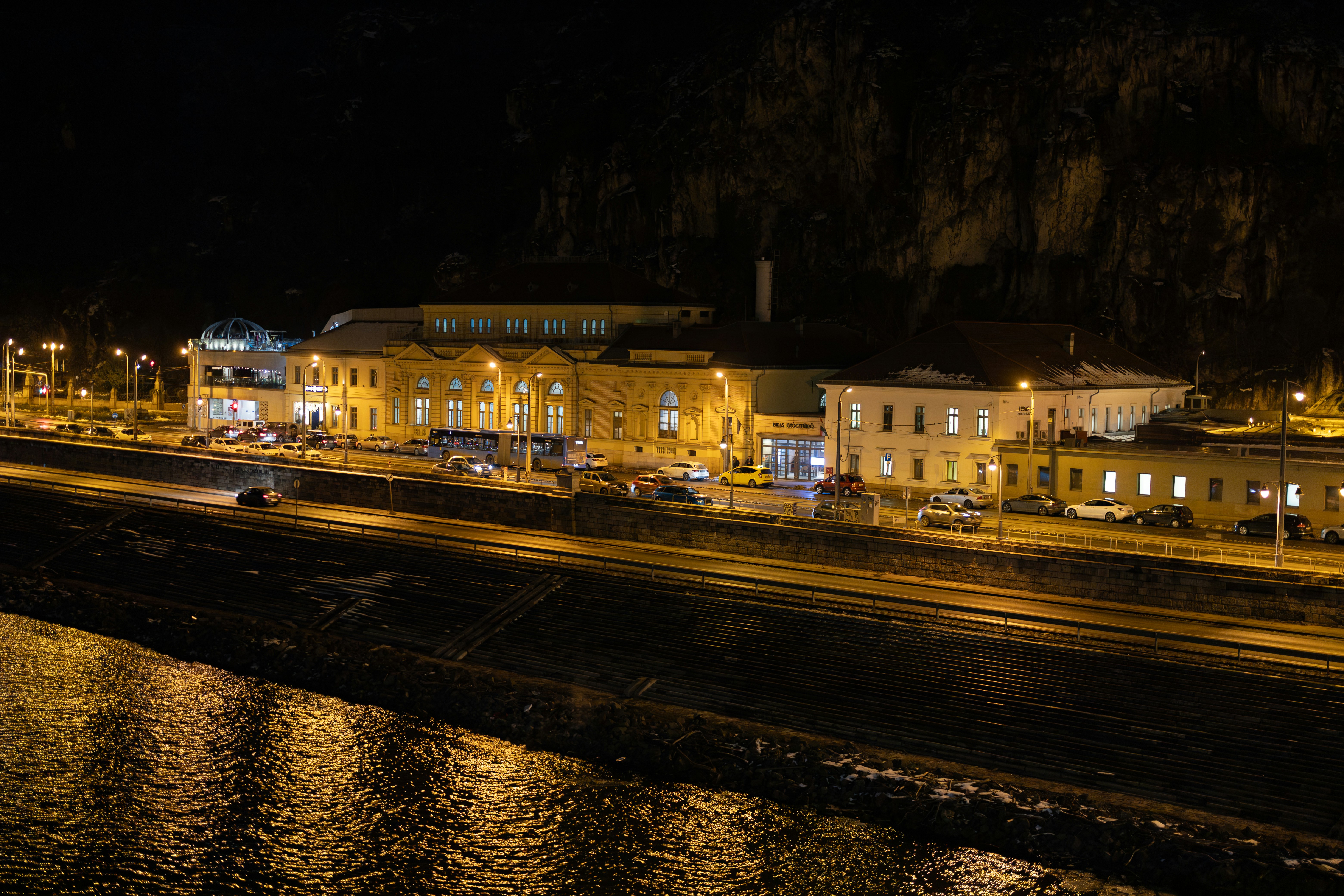Night by the Waterfront: Coastline Lights and Harbour Facade