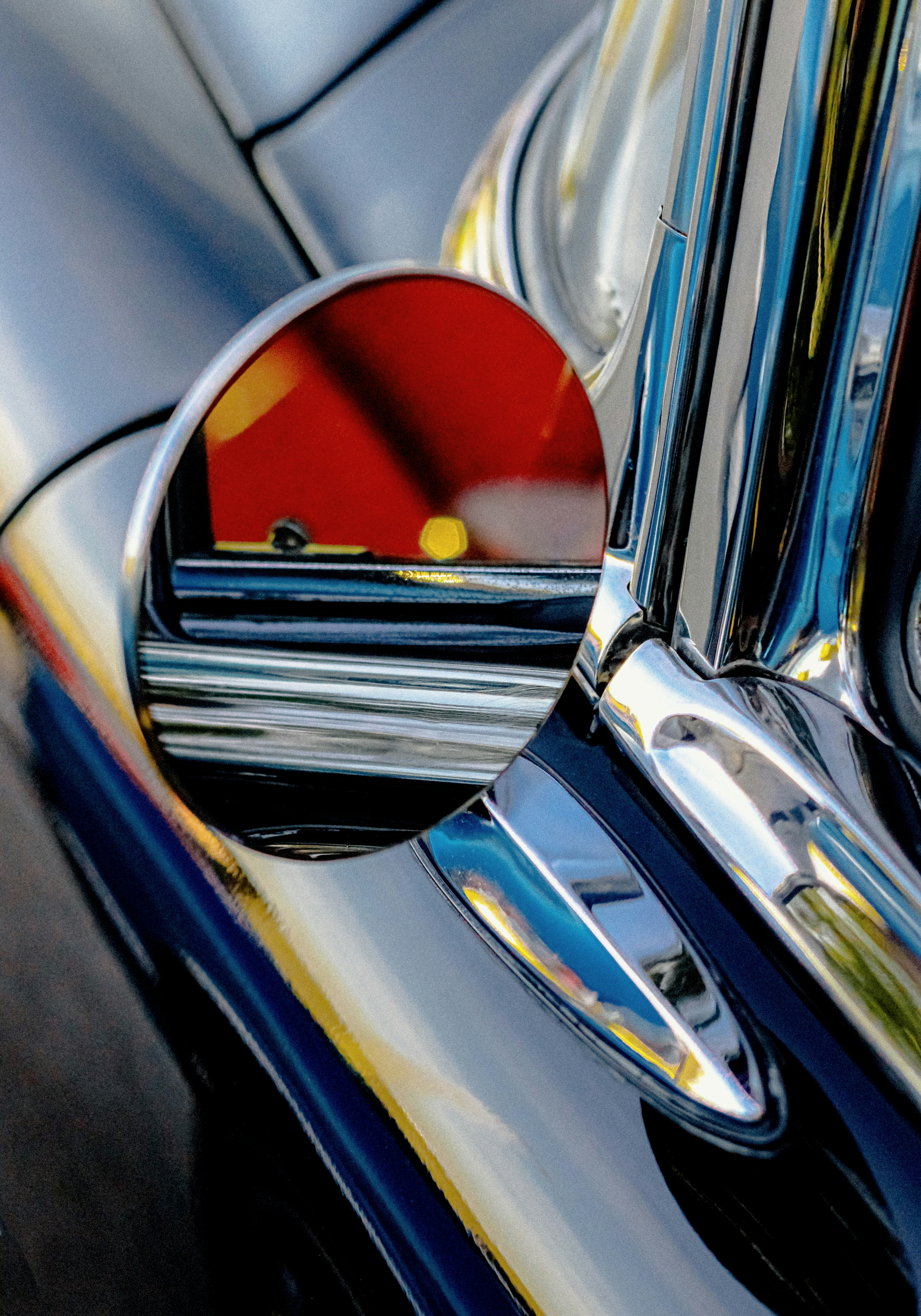 Chromed Reflection: A Closer Look at a Classic Car Mirror