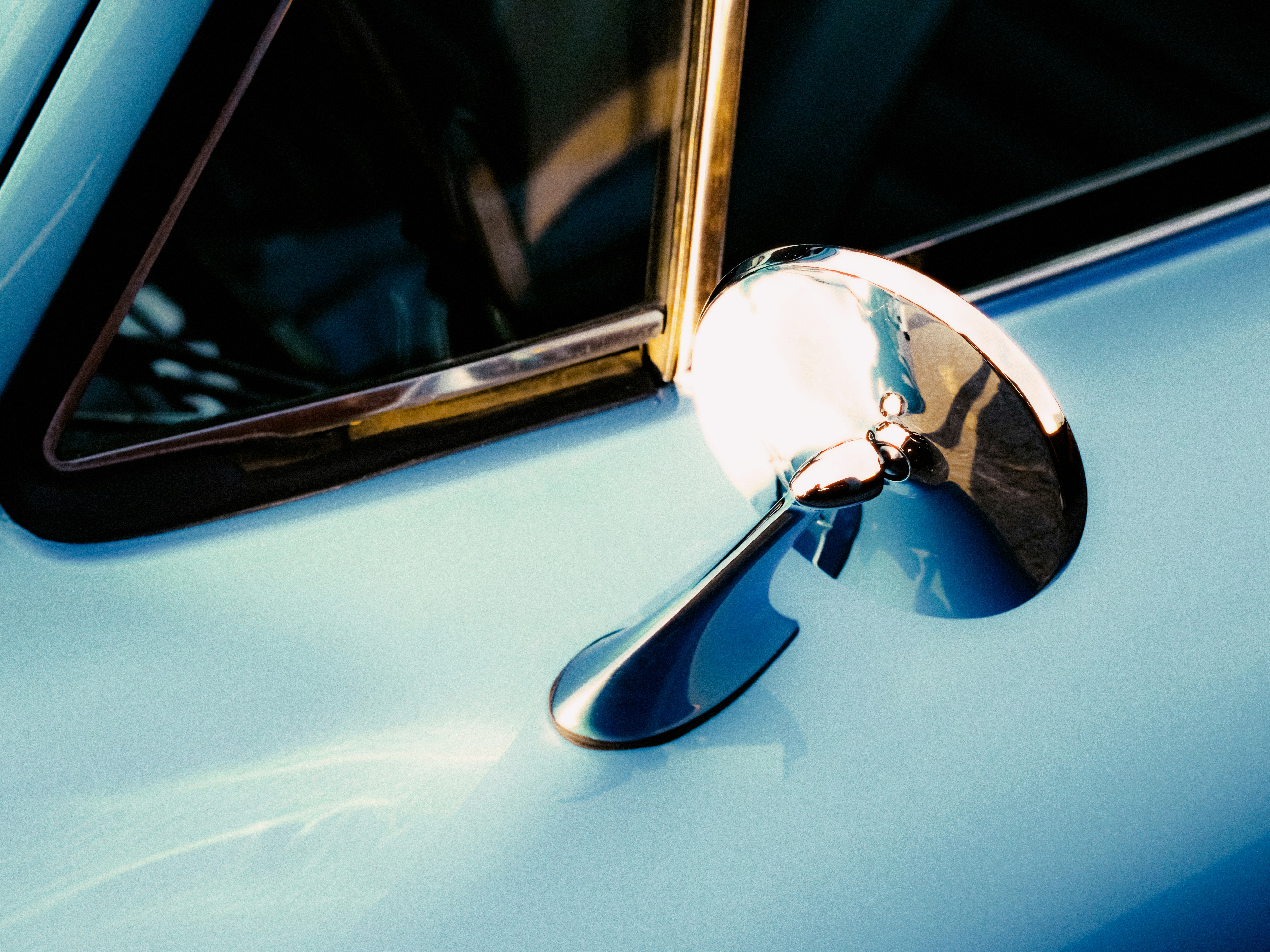 Chrome Knob and Minted Metal: A Glint of Vintage Car Detail