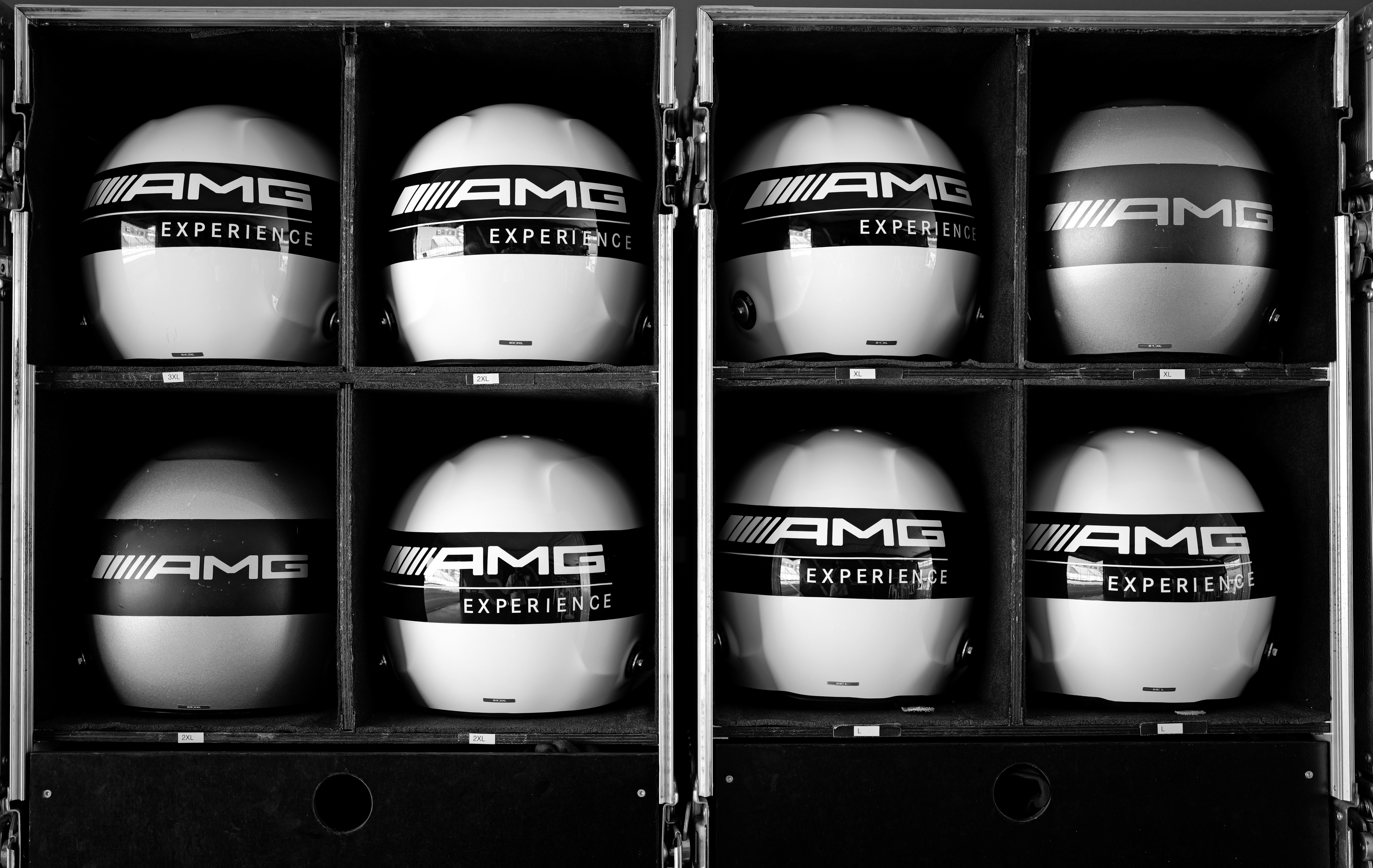 Symmetrical Racing Helmets in a Grid of Silence