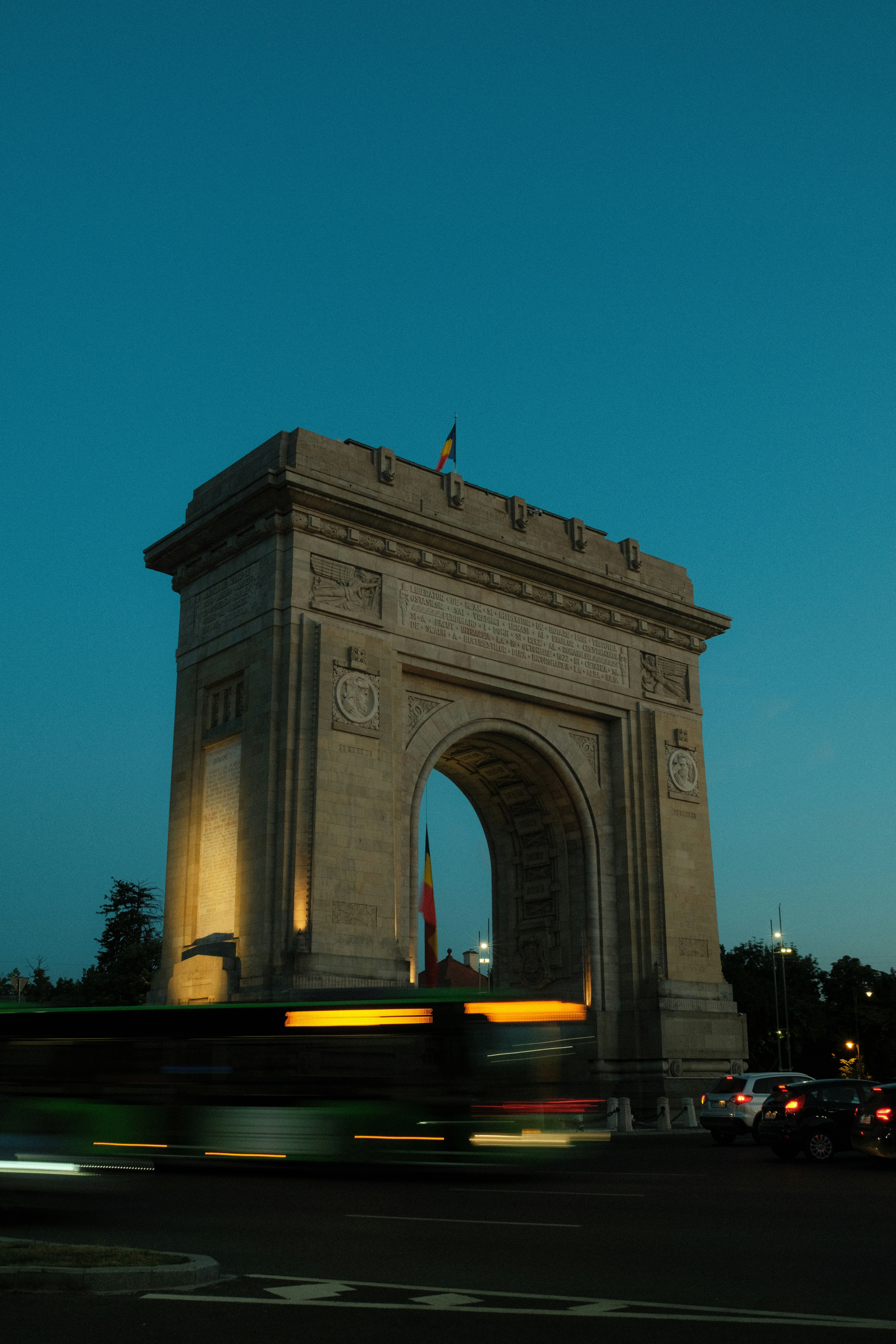 Arc of Esteem: A nighttime arc under the blue hour sky