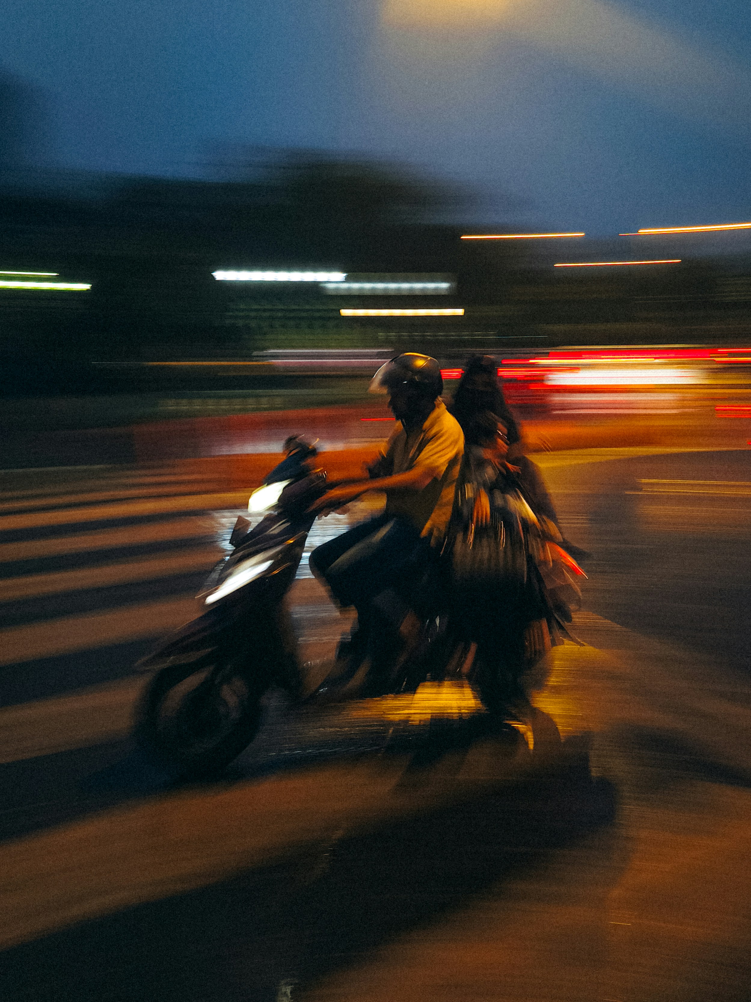 Motion Through Night: A Blurred Ride Across City Lights