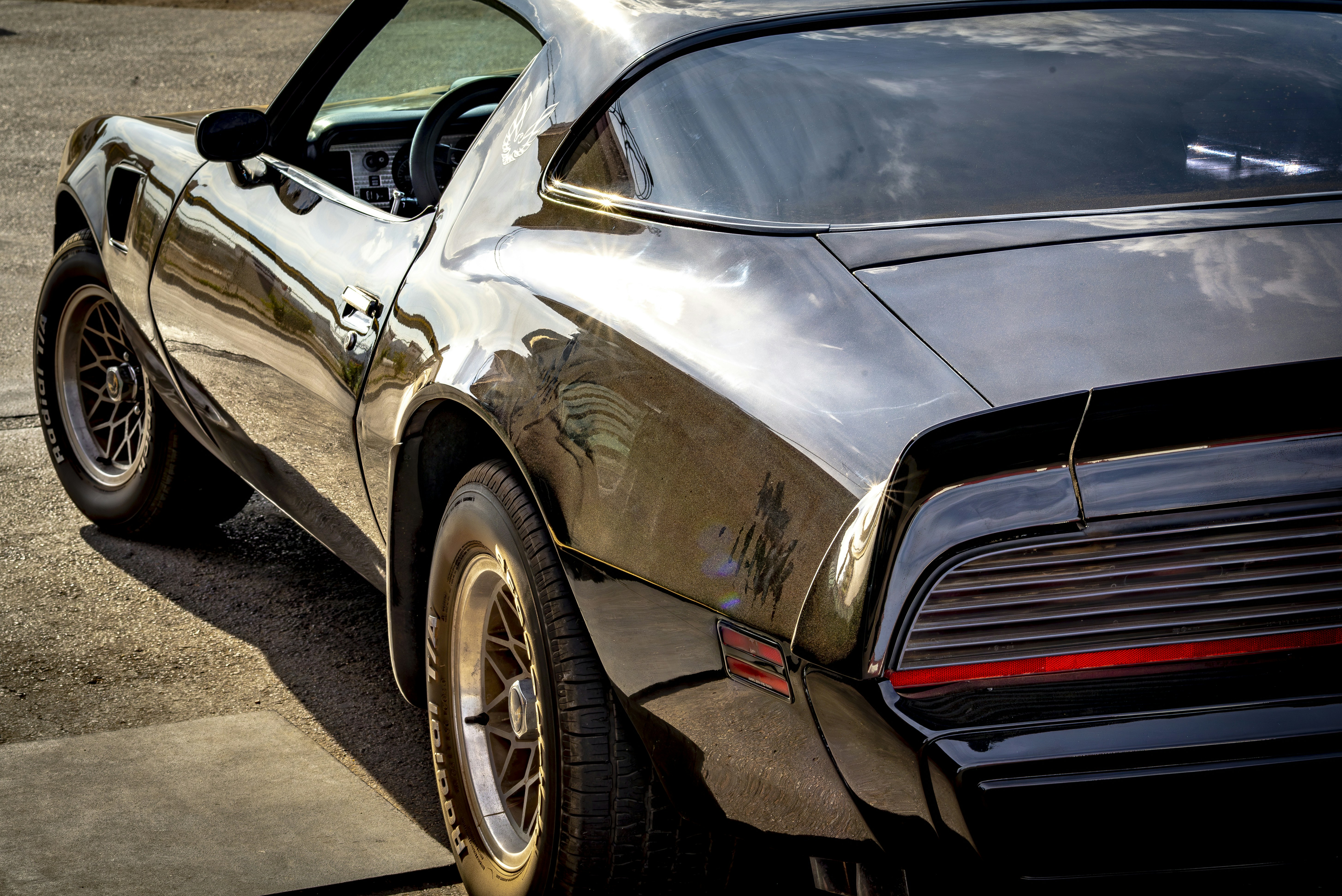 Polished Chrome and Muscle: A Classic Car Resting in Golden Light