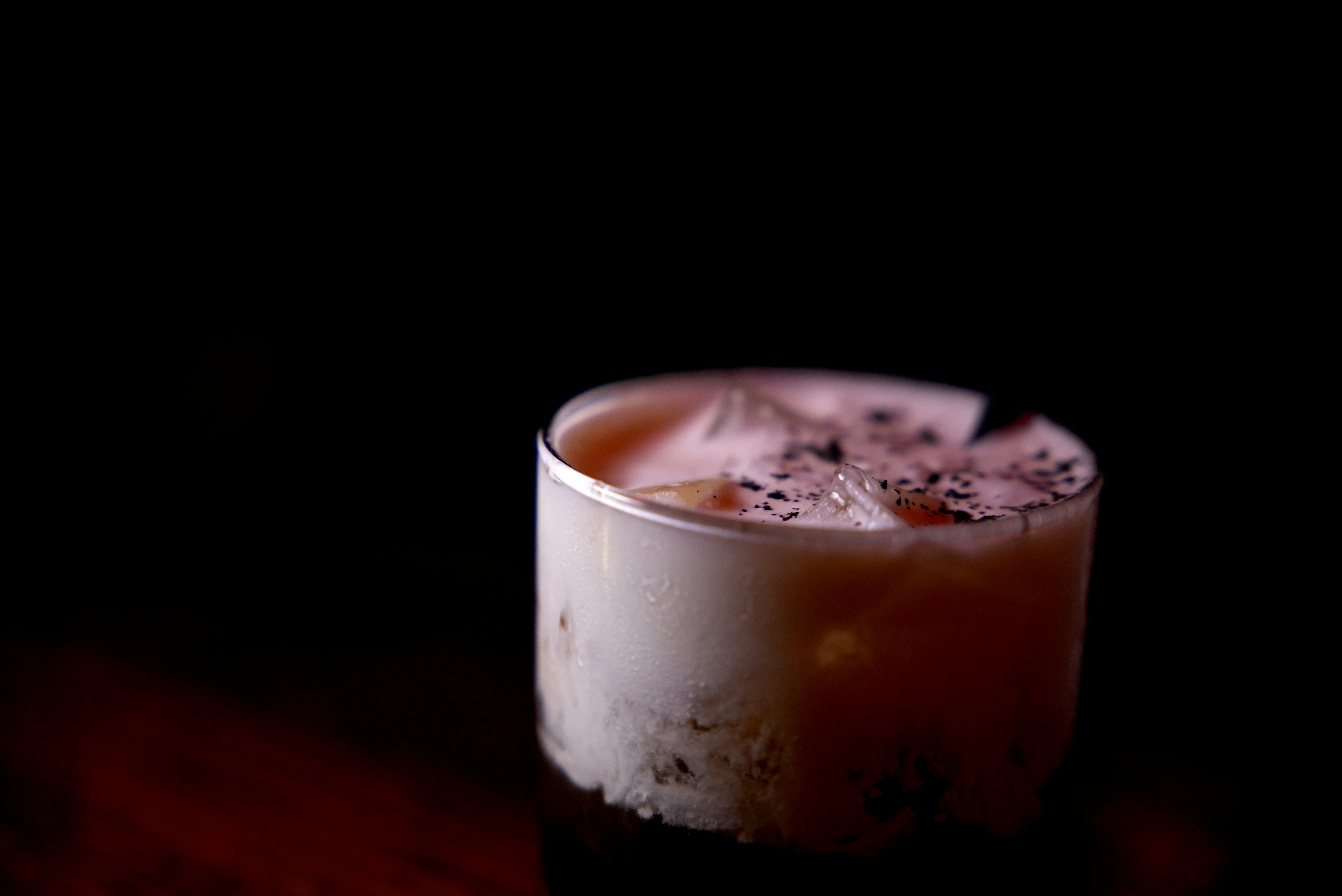 Dim Whiskey, Ice and Shadow: A Quiet Drink in a Velvet Night