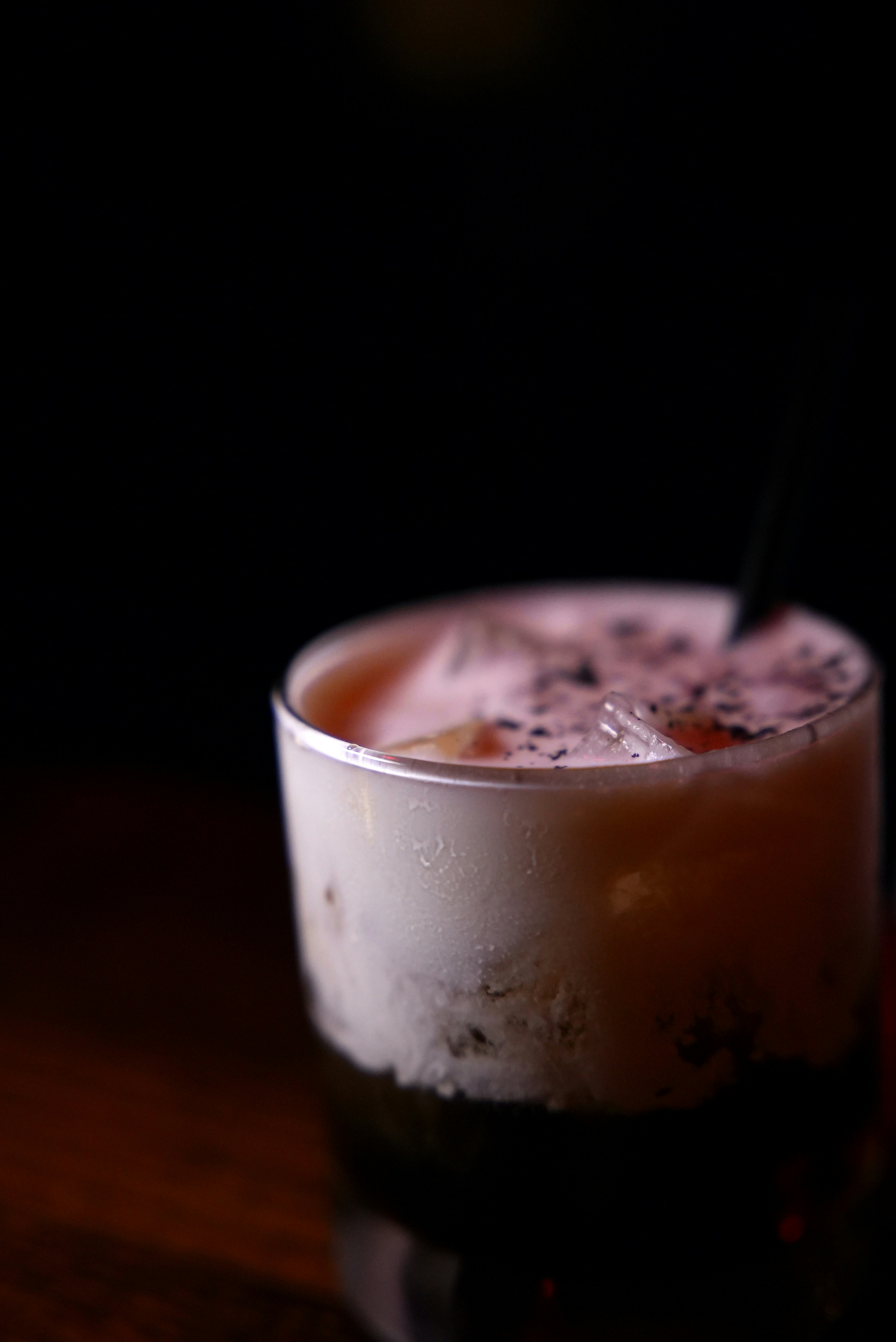 Twilight Cocktail: Creamy Foam and Dark Drizzle
