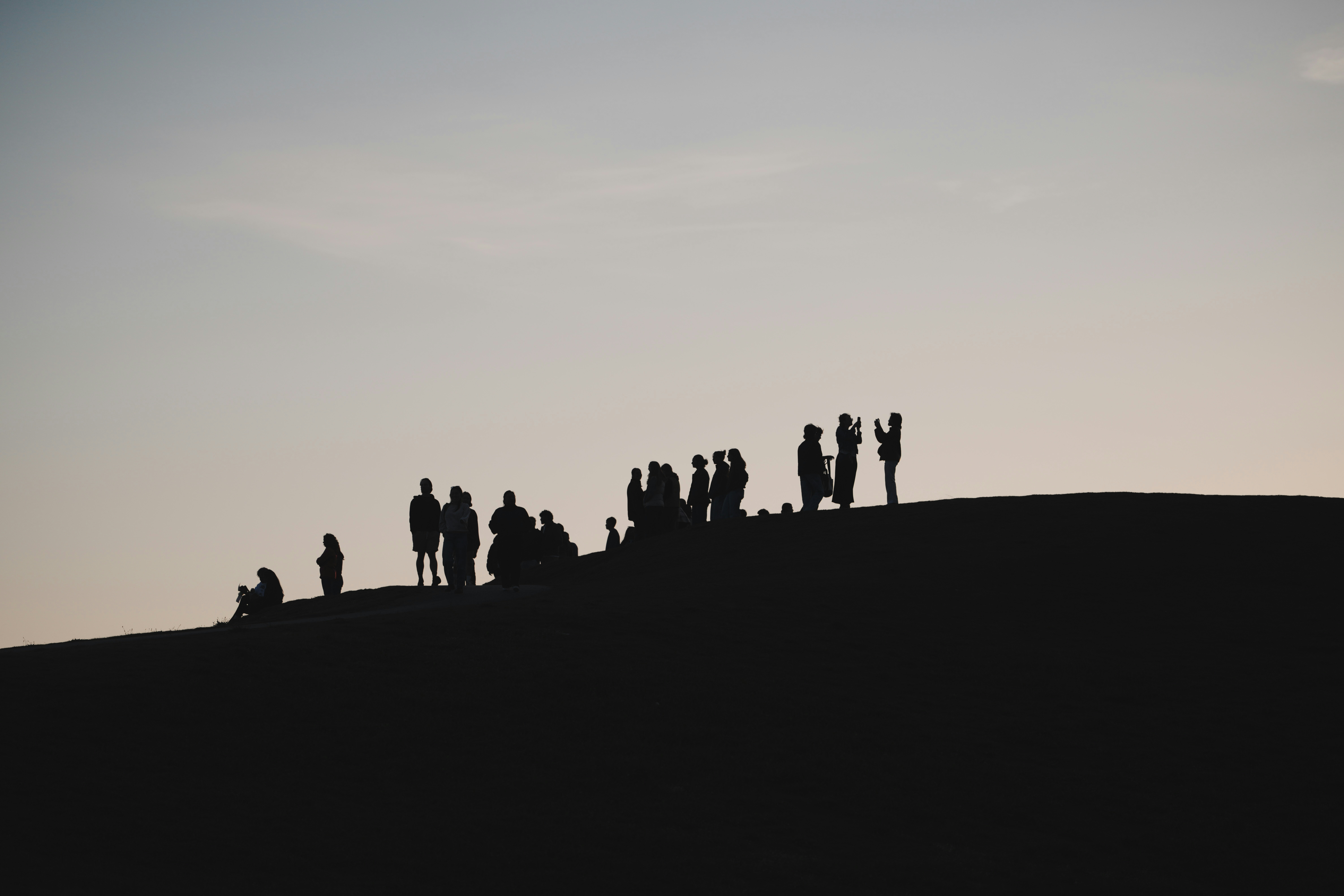 Silhouette on the Dune Ridge at Dusk
