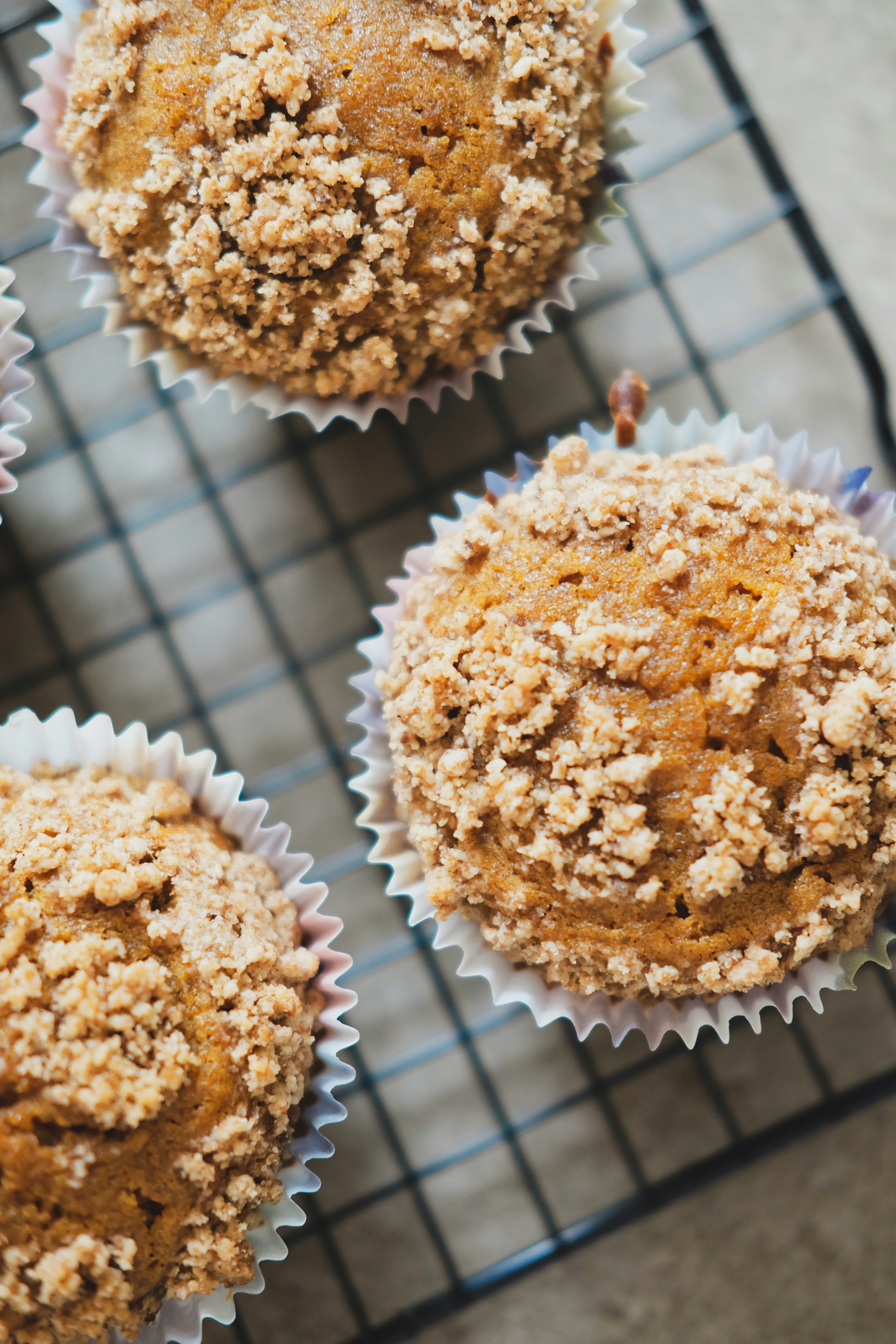 Crisp Sugar-Crumbled Muffins Cooling on a Wire Rack