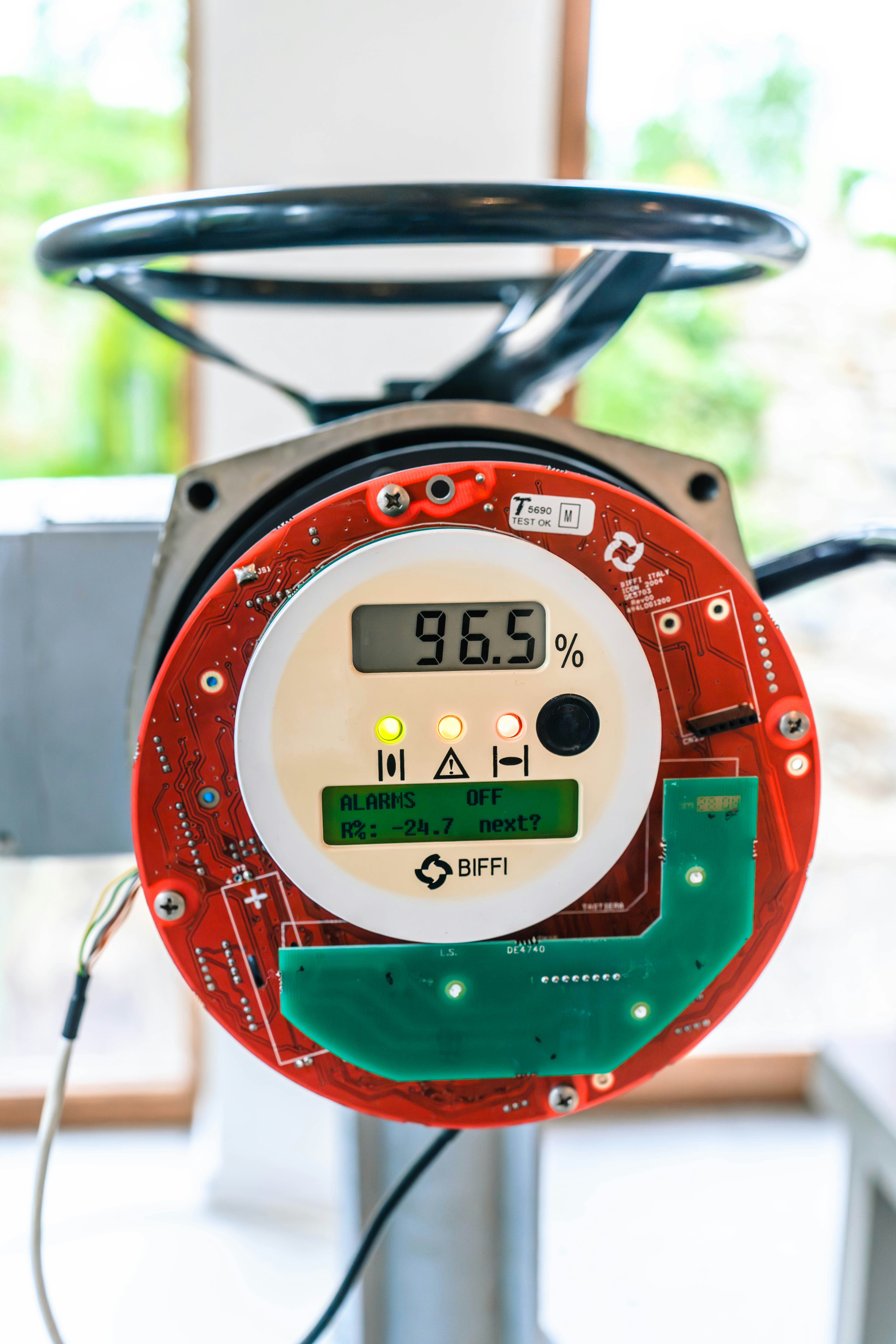 Red Metered Core: A Close-Up of a Modern Utility Gauge