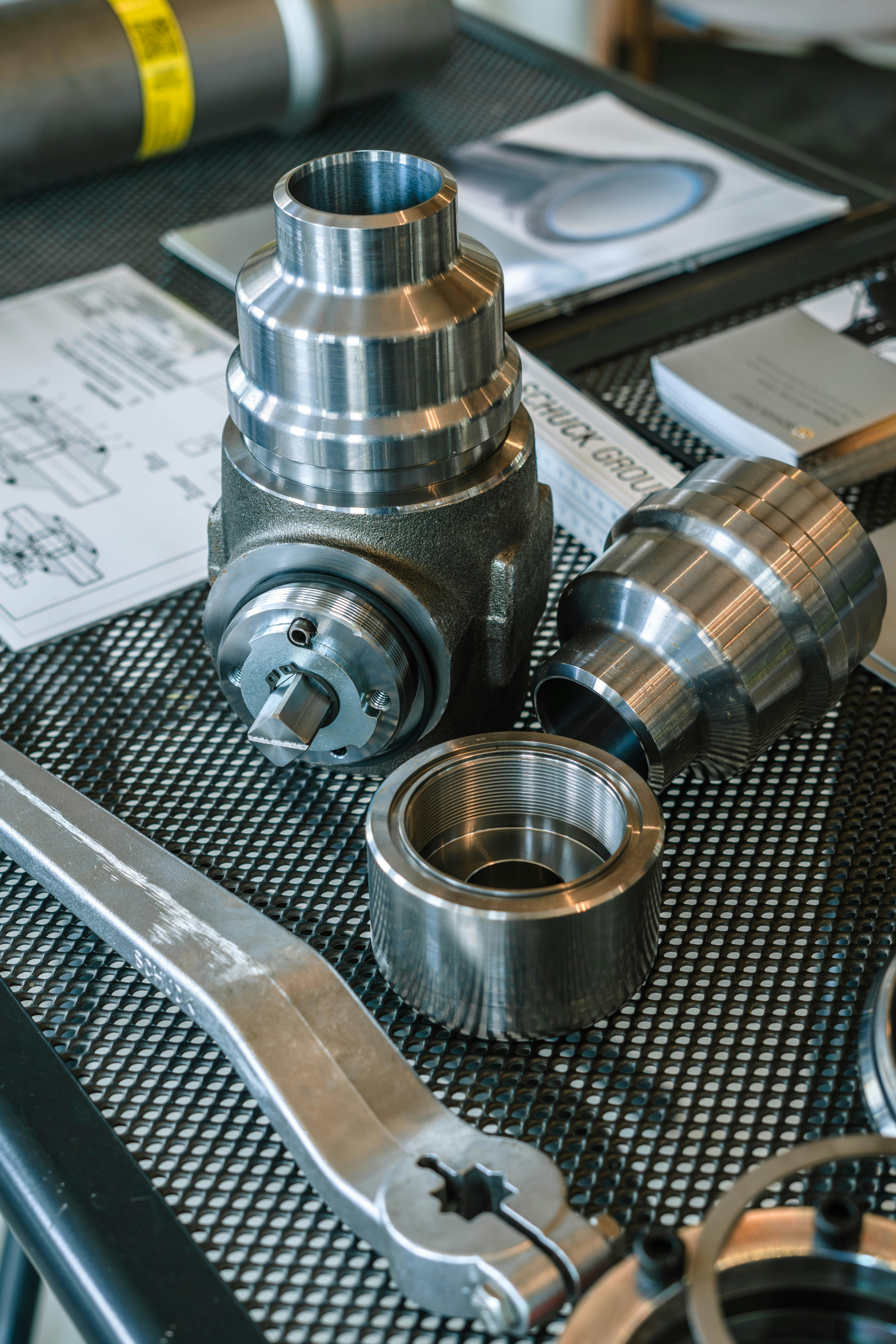 Machined Precision: A Workshop Scene of Cylinders and Tools