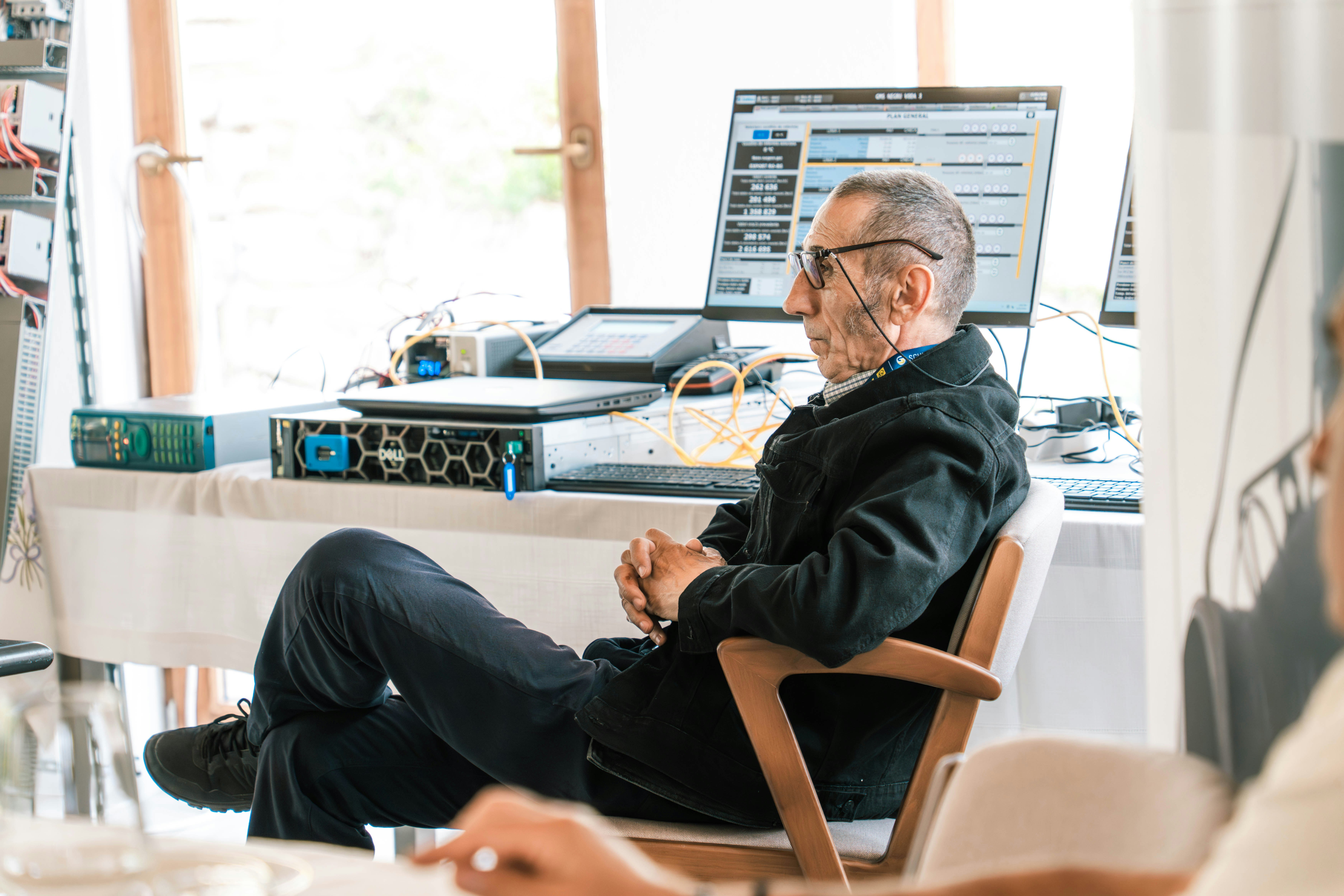 Tech Veteran in a Modern Studio: Focused in the Noise