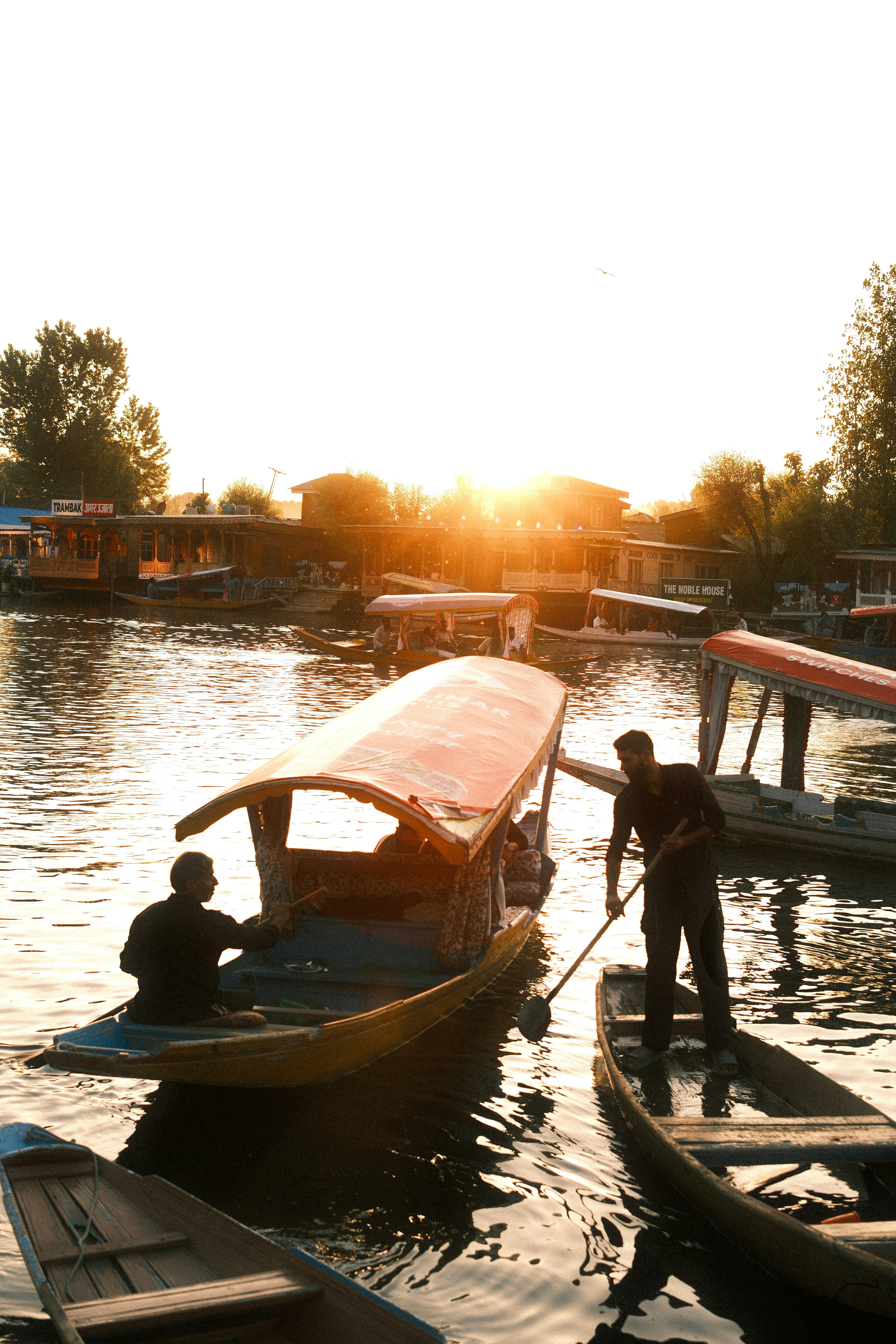 Dawn at the Riverside Market: Boats and Oars in Quiet Light