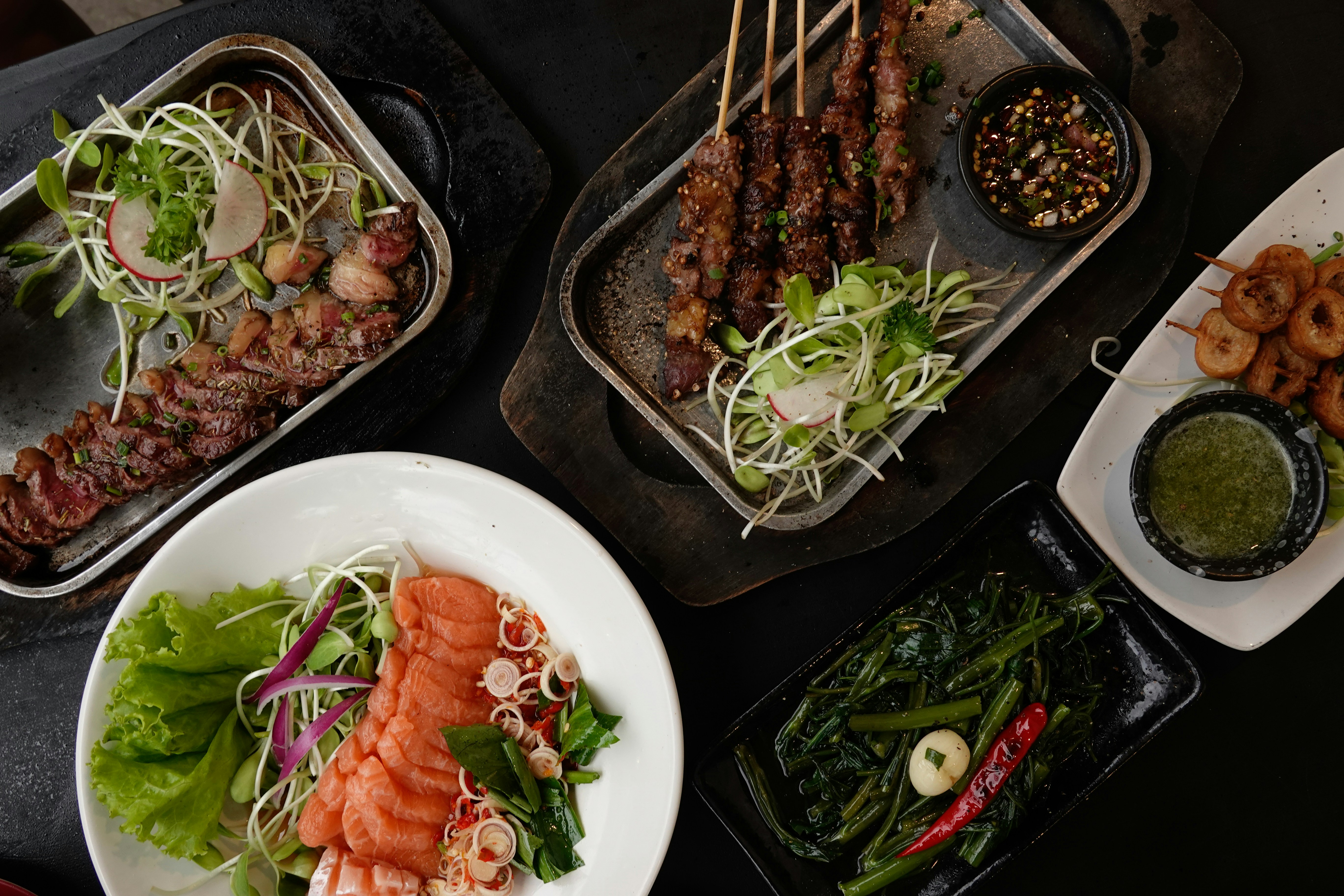 Skewers and Salmon: a vibrant spread of grilled bites and greens