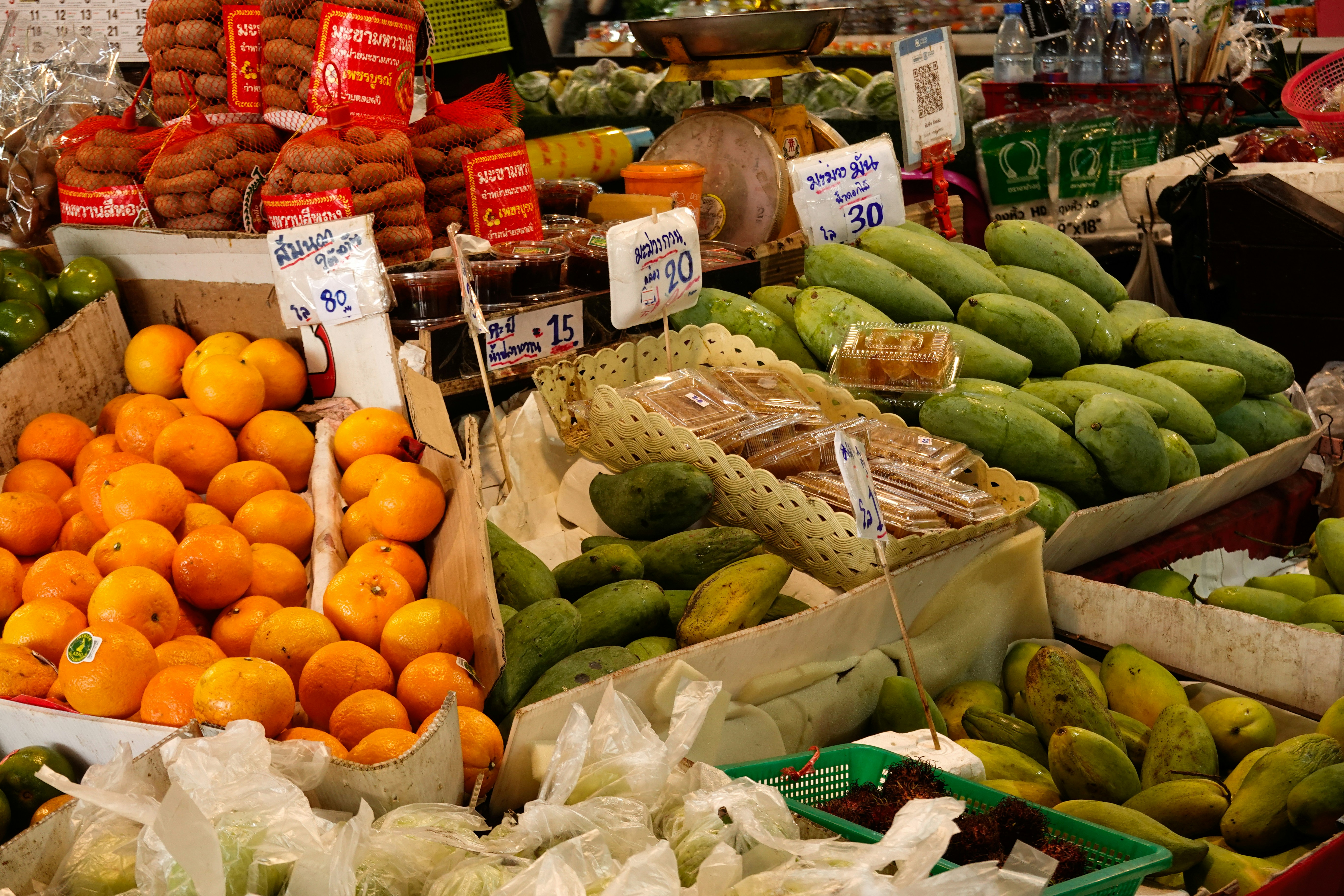 Vibrant Orchard Marketplace Stacks of Citrus and Tropical Fruits