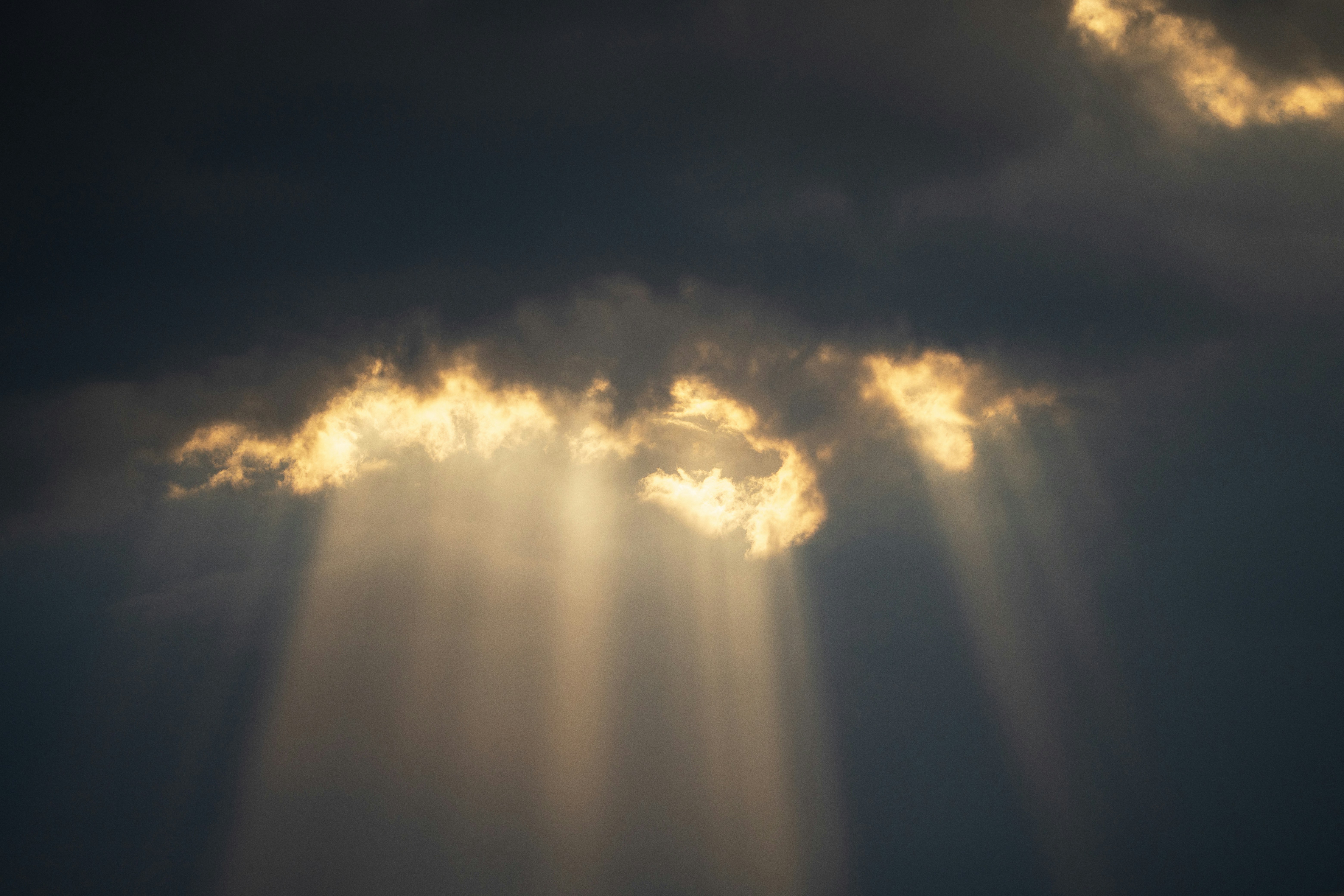 Sunbeams Piercing a Cloudbreak