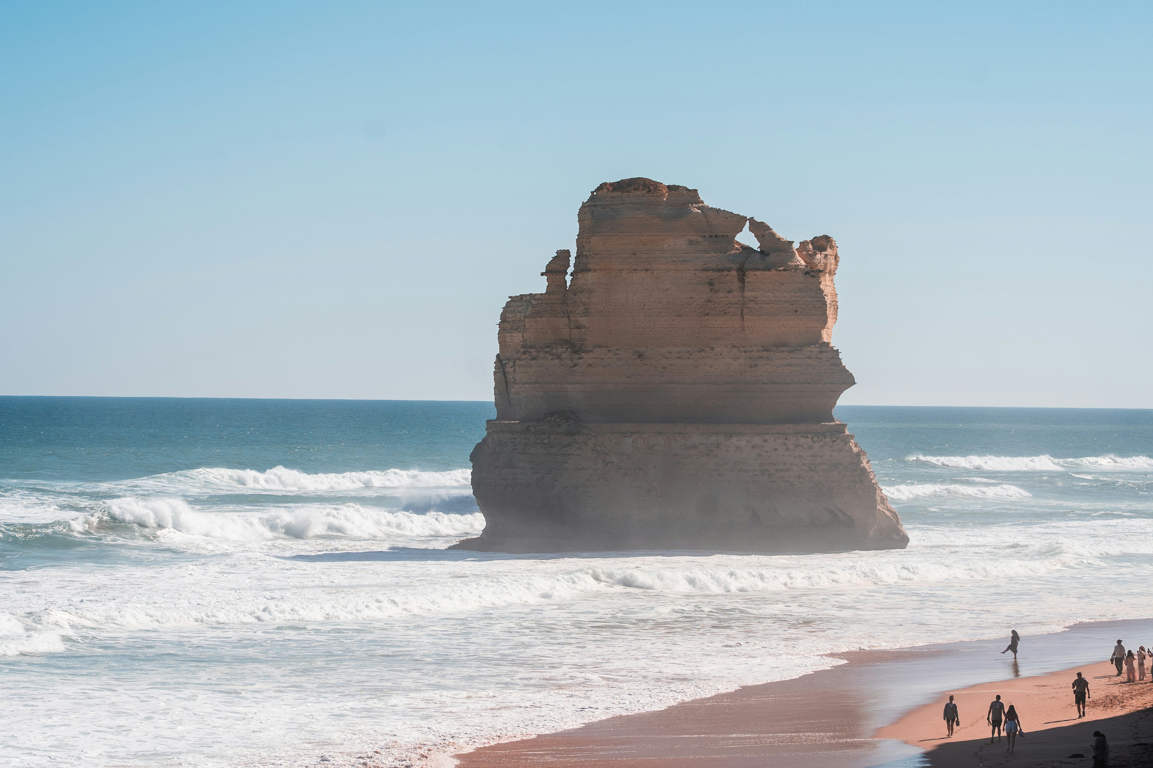 Coastal Monolith: A solitary sea-stone rising from the shoreline