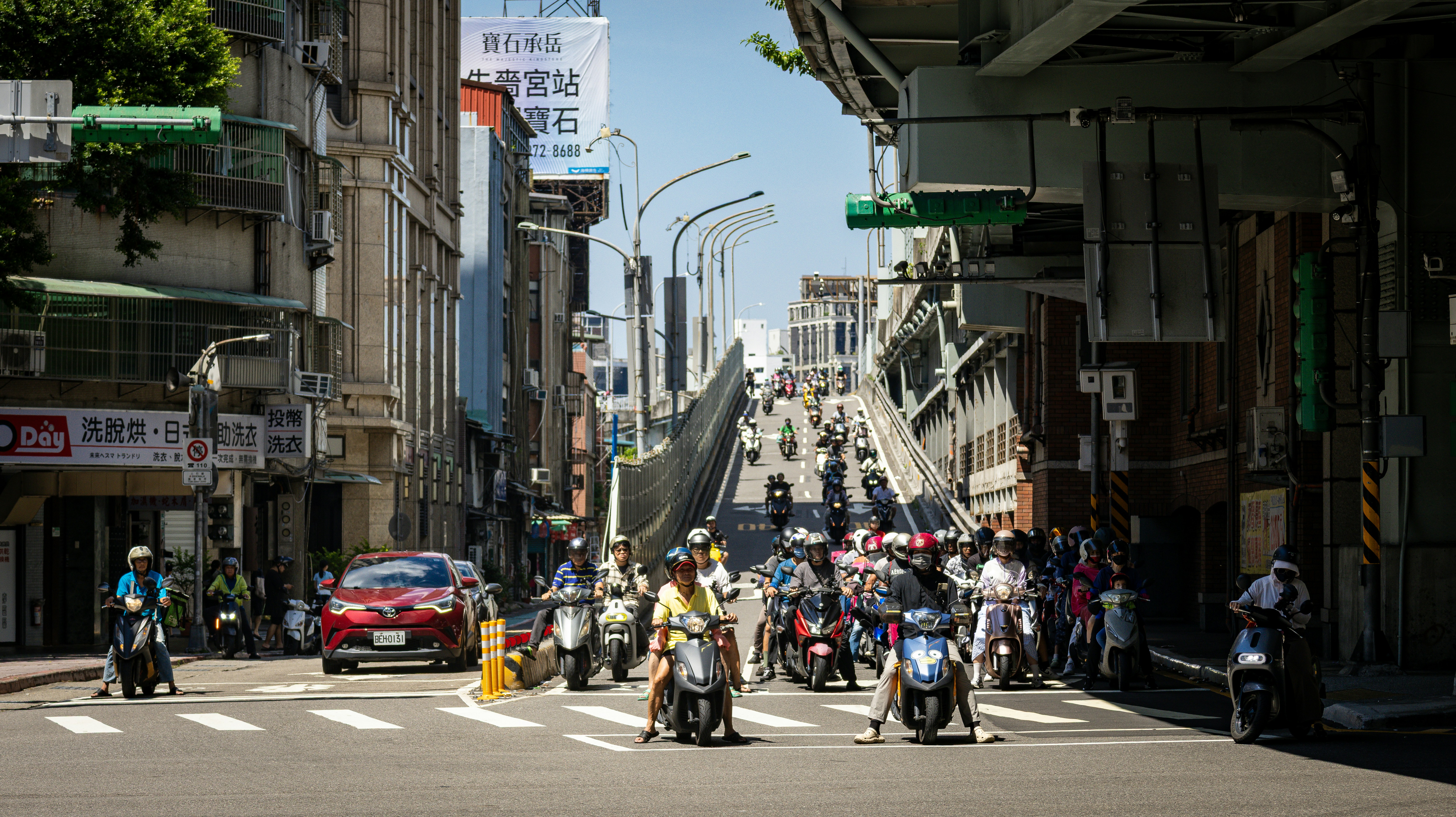 Street Rush: Motorbikes Rally Through an Urban Corridor