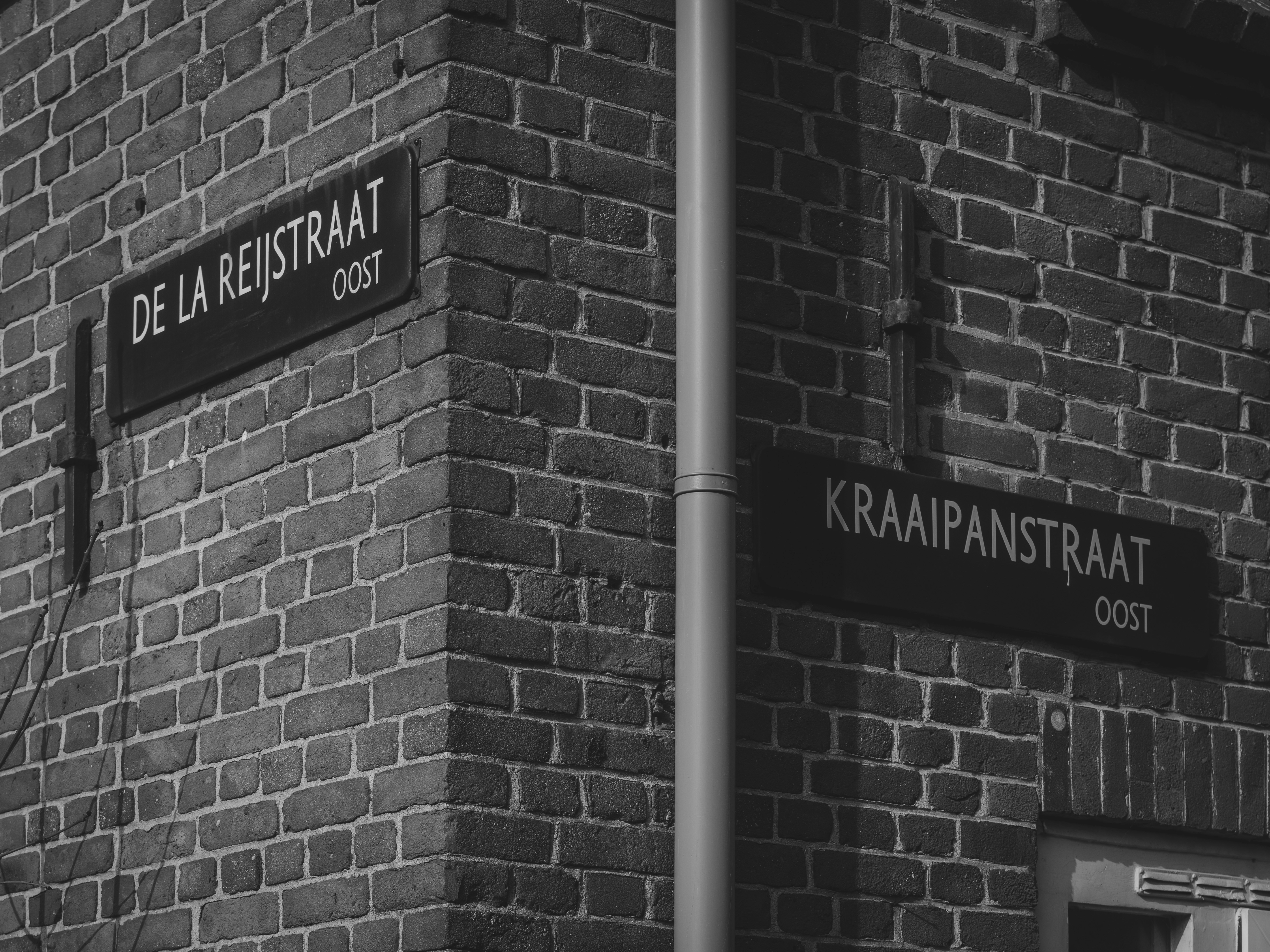 Cornerstones in Shadow: A Quiet Dutch Brick Street
