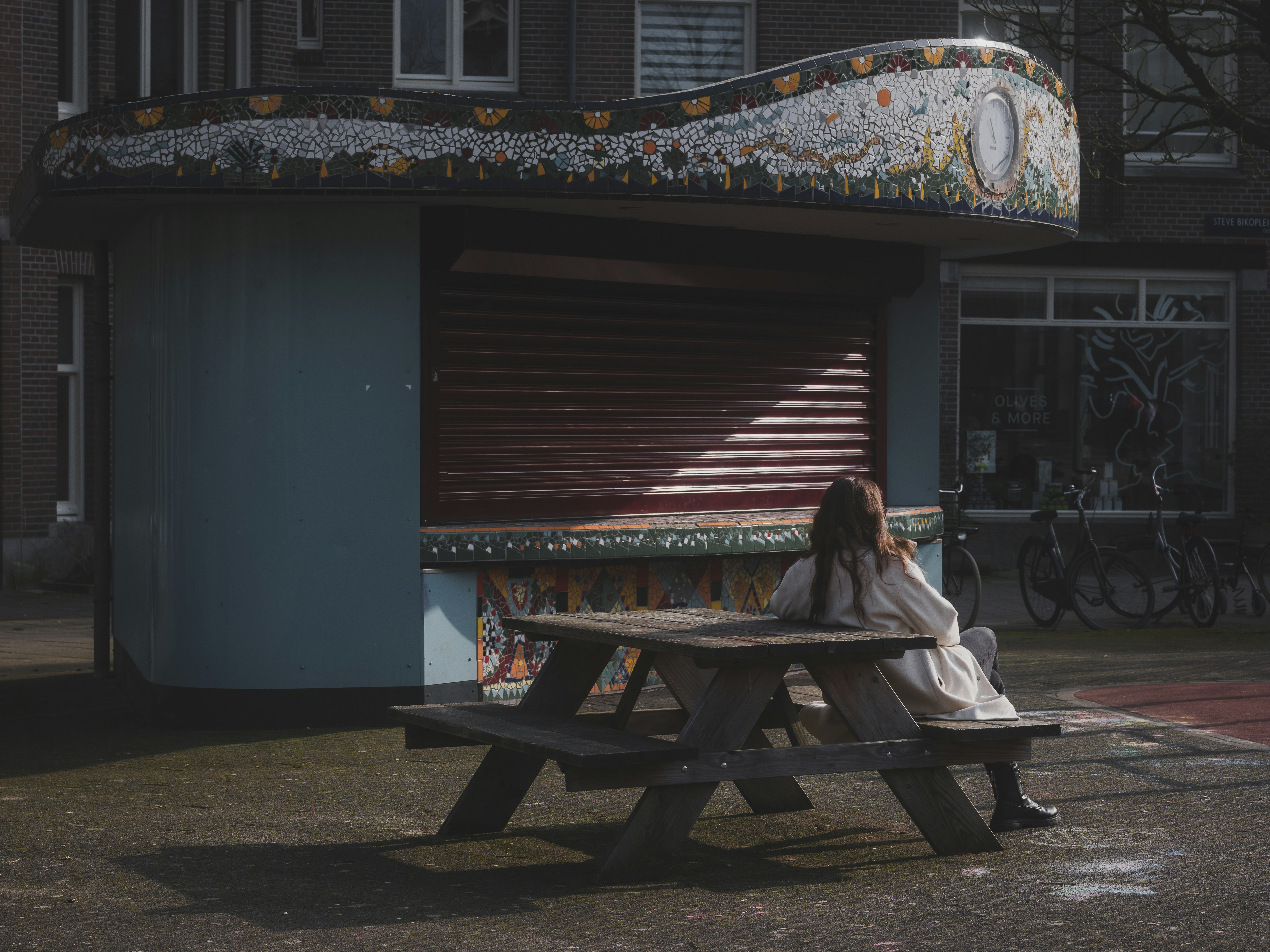 Quiet Moment at a Mosaic Shopfront