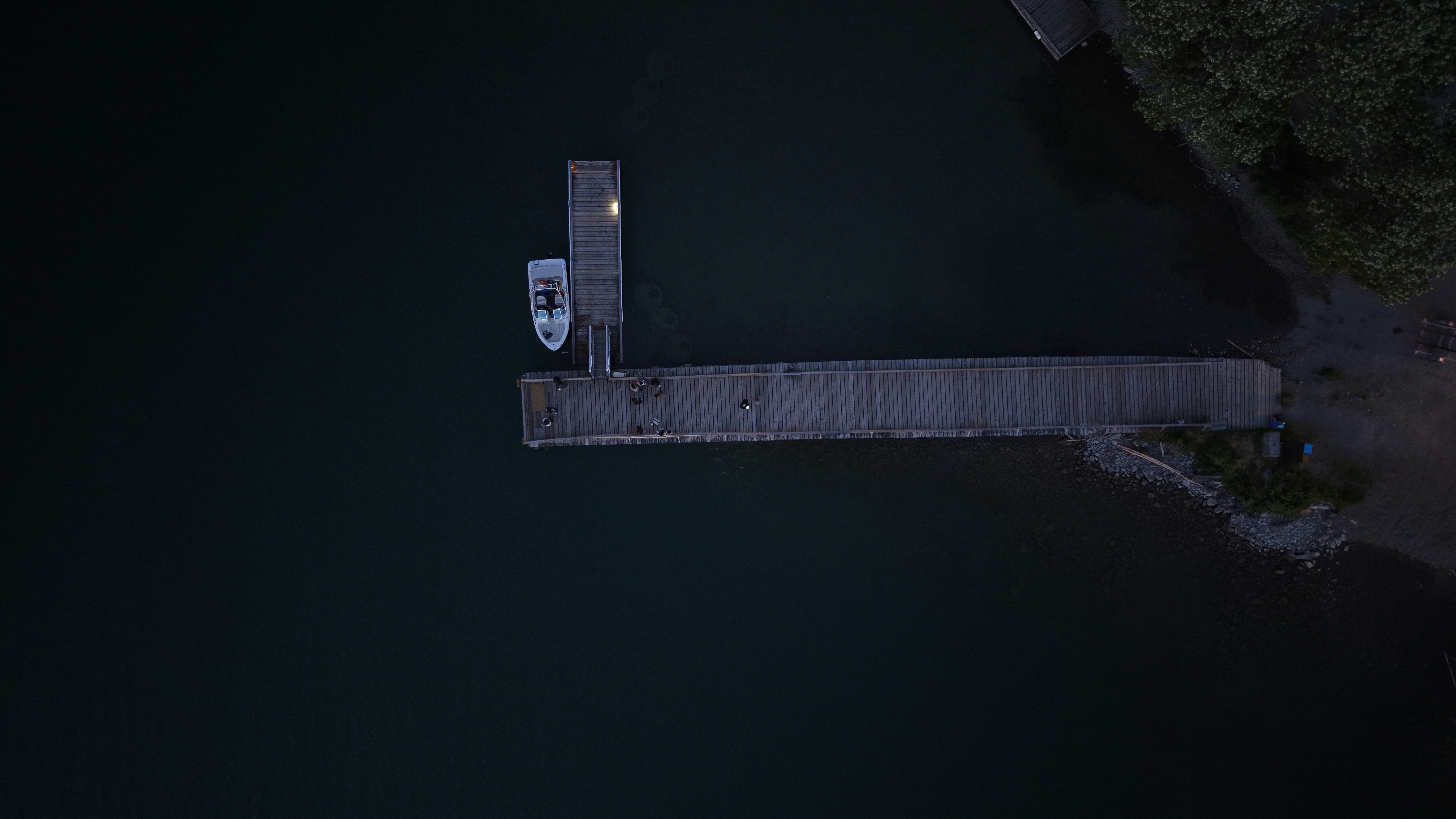Dockside Odyssey: A Quiet Pier Projects Into Night