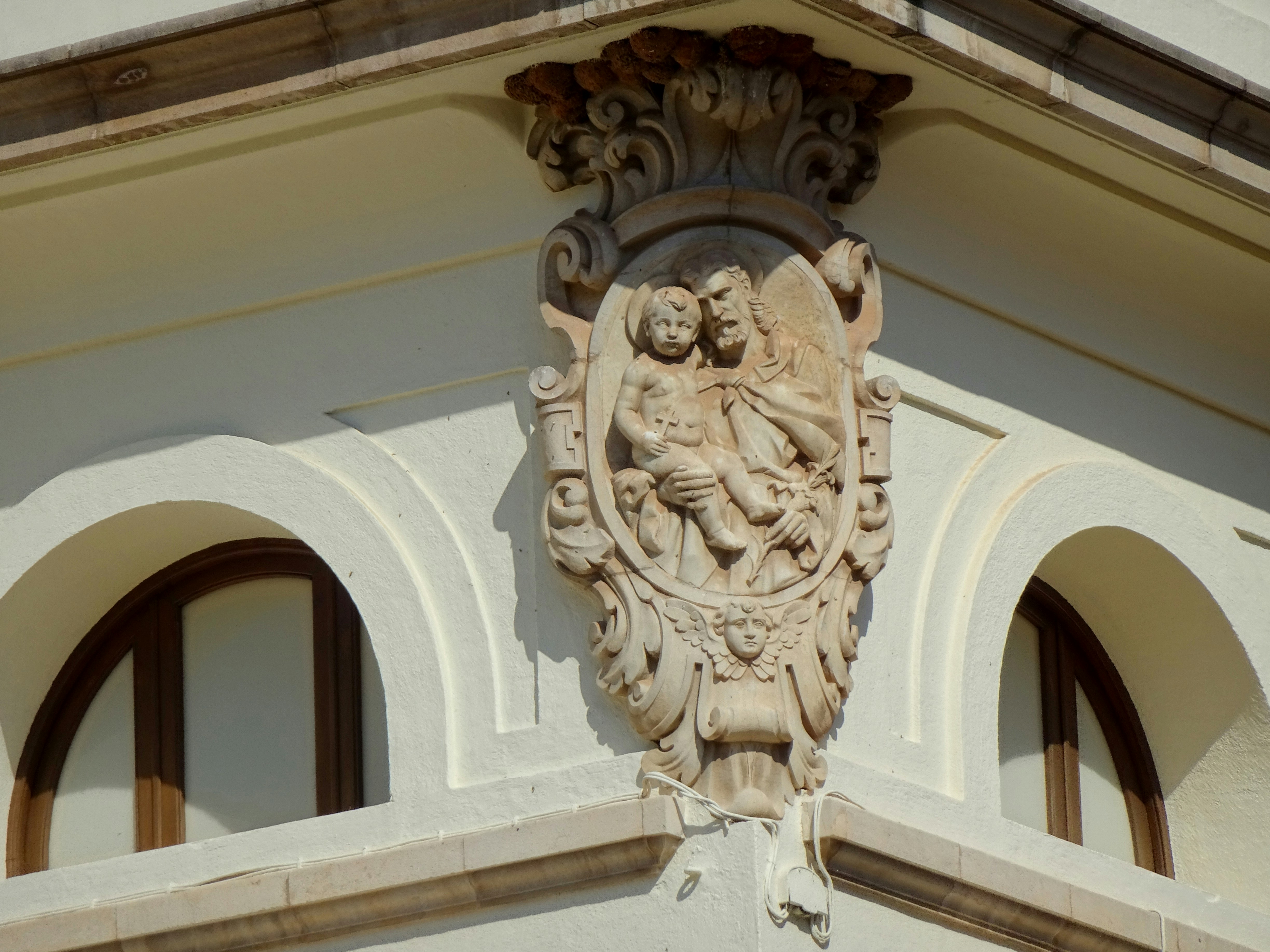 Relief Sculpture Crowned Above the Archway