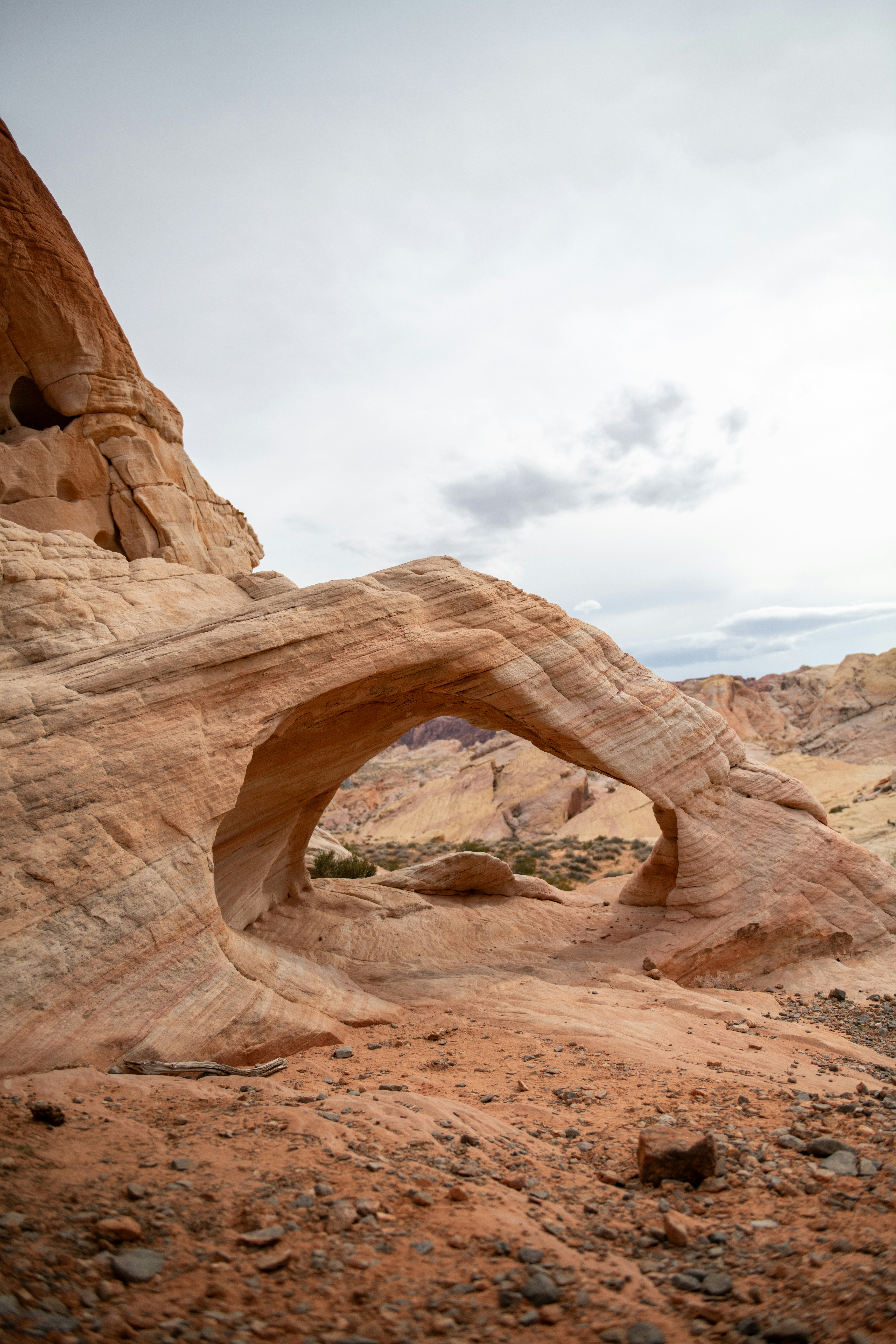 Stone Arch Sunrise: A Natural Hue Arch Framing the Desert Sky