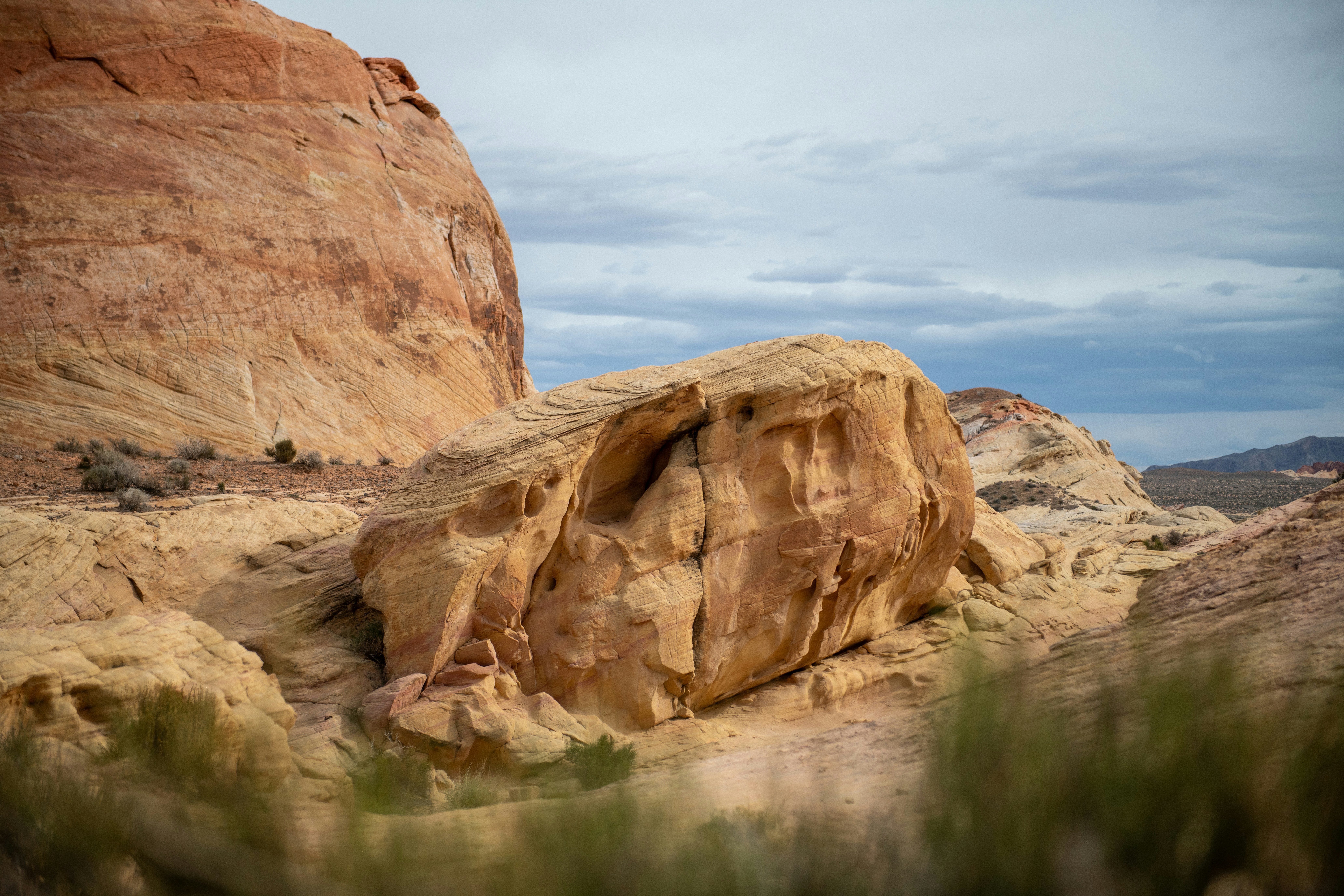 Stone Sentinel: Weathered Sculptures Guard the Desert Rim