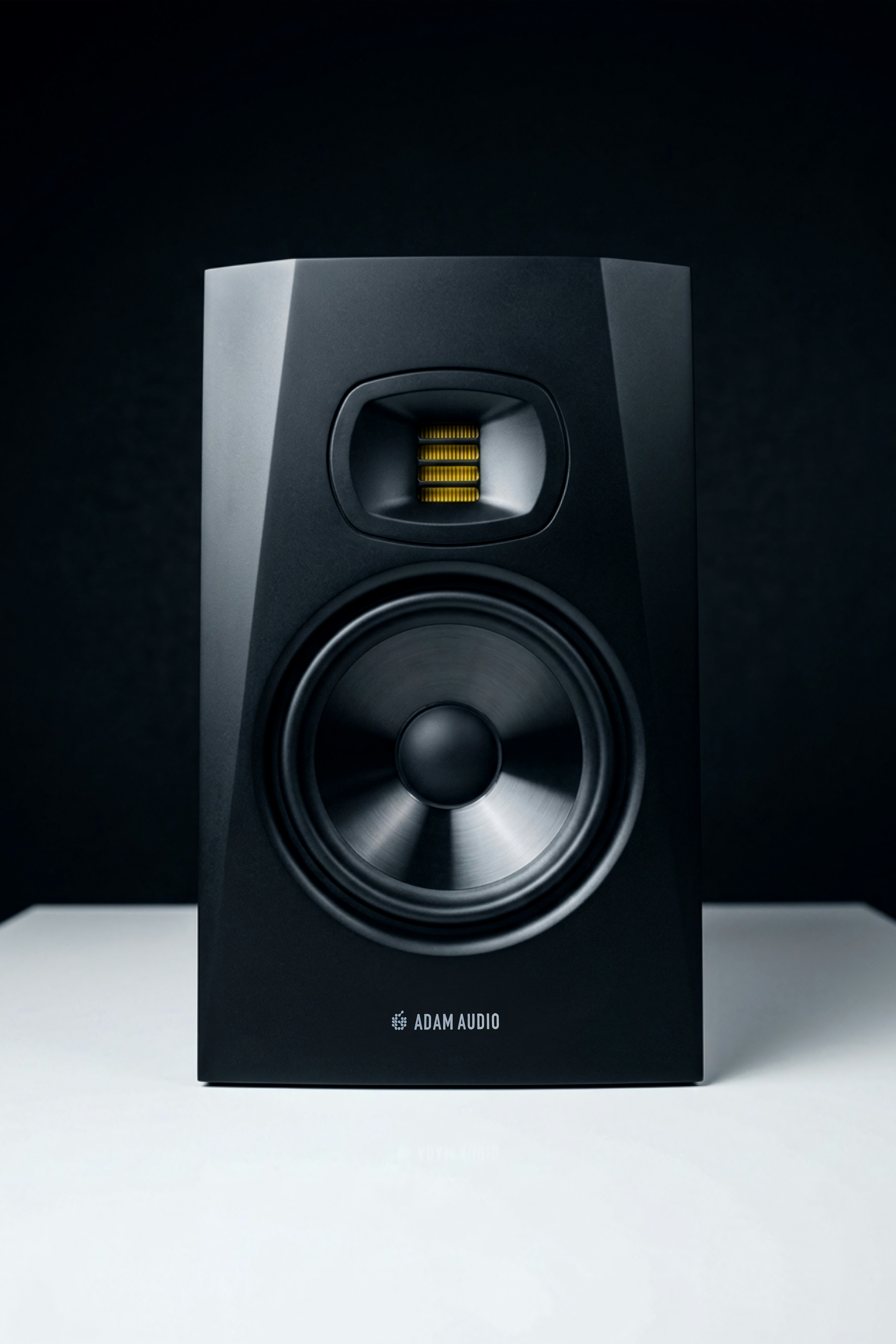 Studio Monitor Standout: Adam Audio Speaker Rising from a Quiet Studio