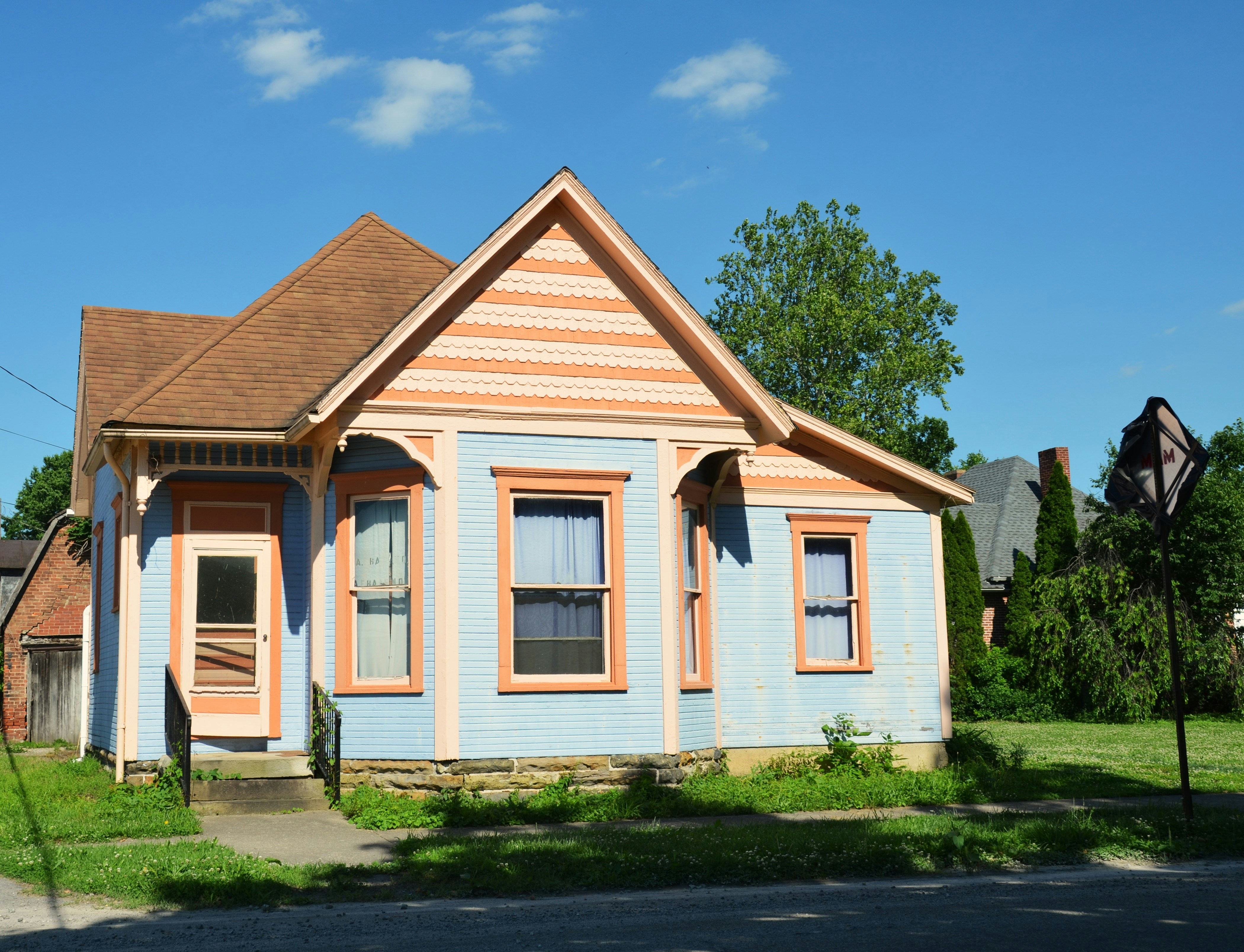Pastel Cottage on a Sunny Corner